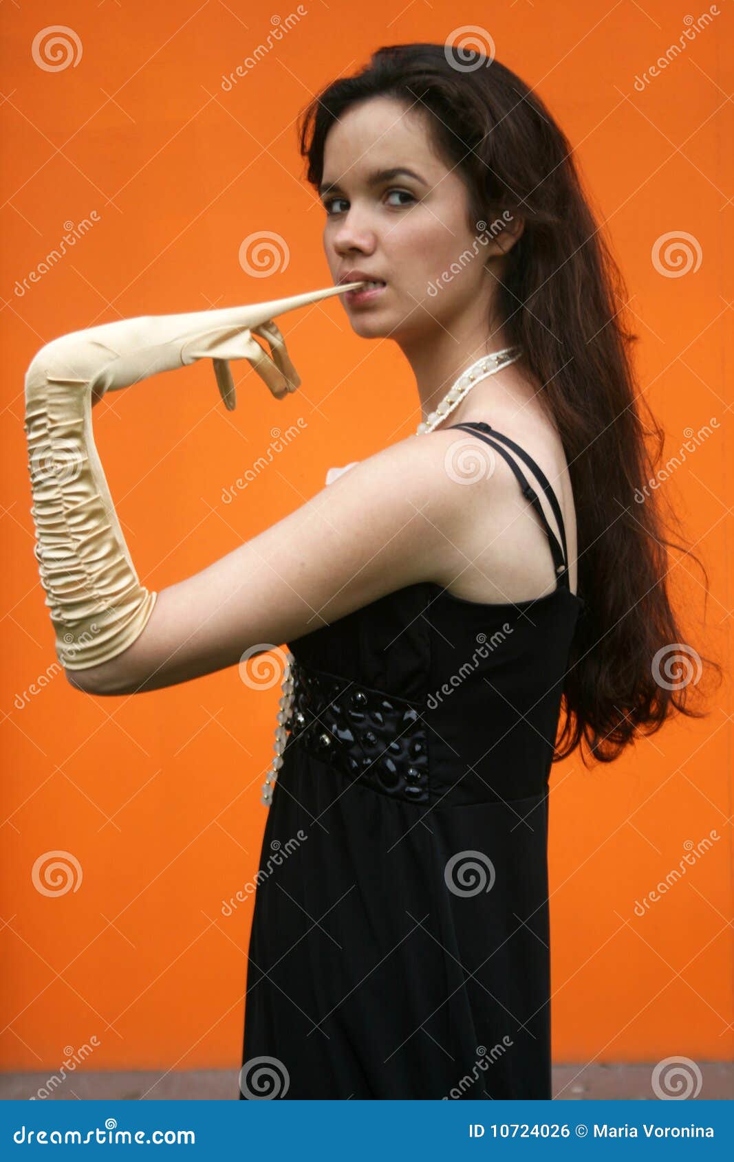 Girl taking off her glove stock photo. Image of fashionable - 10724026