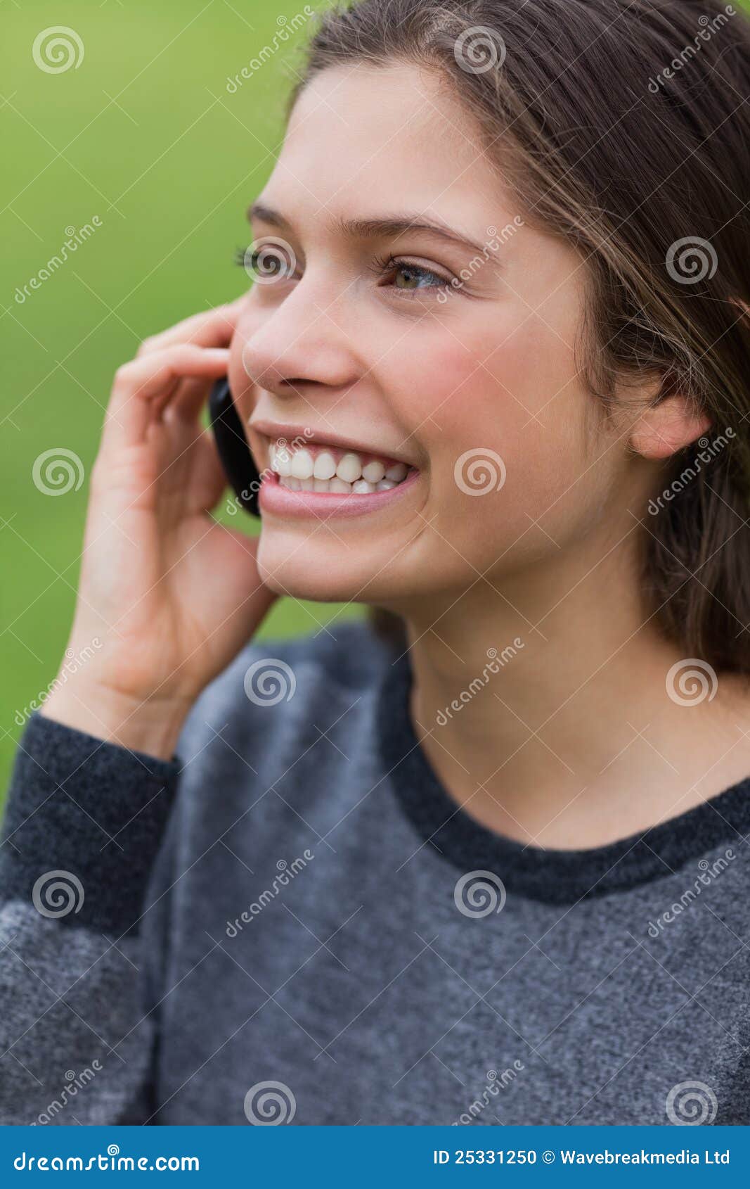Girl Talking on Her Cellphone while Standing Up Stock Photo - Image of ...