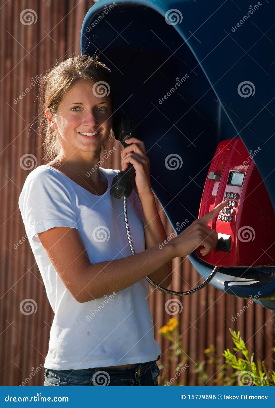 Girl in telephone box stock photo. Image of face, telephone - 15779696