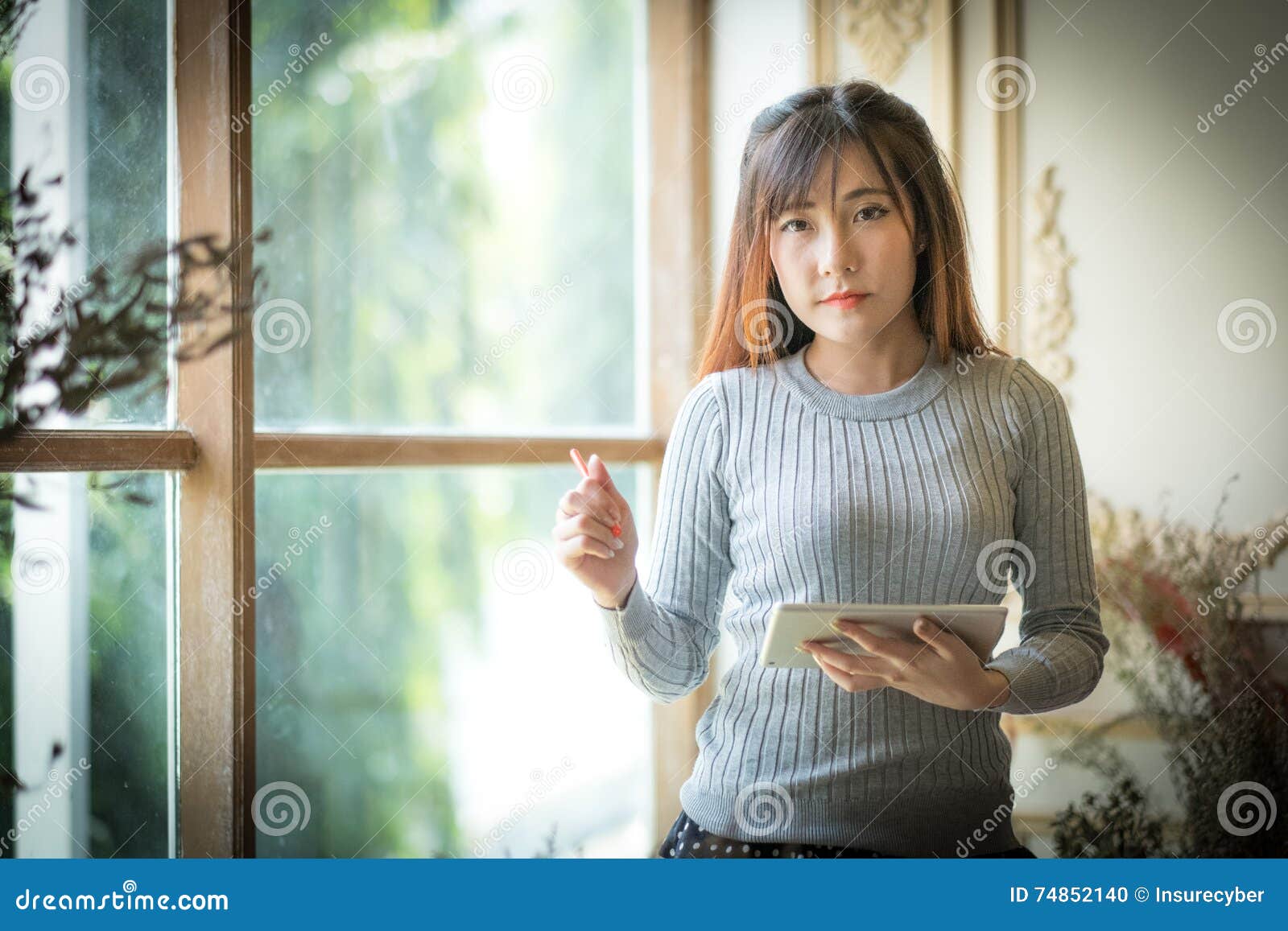 The Girl Texting on the Tablet Computer ,with Space for Text Ads Stock ...