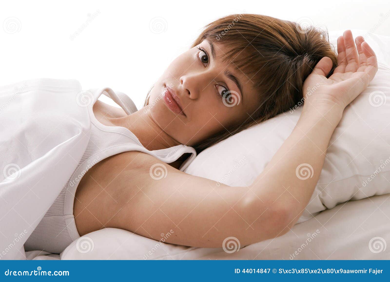 Girl thinking in bed stock image. Image of cute, sheets - 44014847