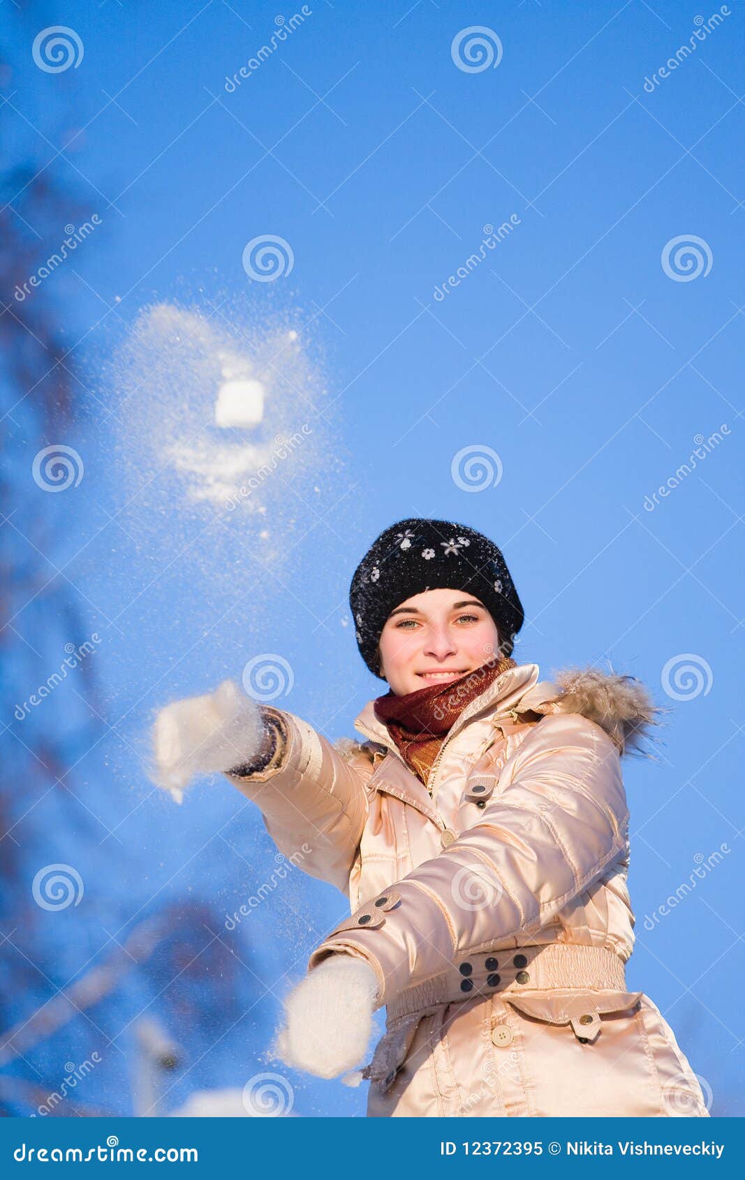 Girl throwing snowballs stock image. Image of outdoor - 12372395