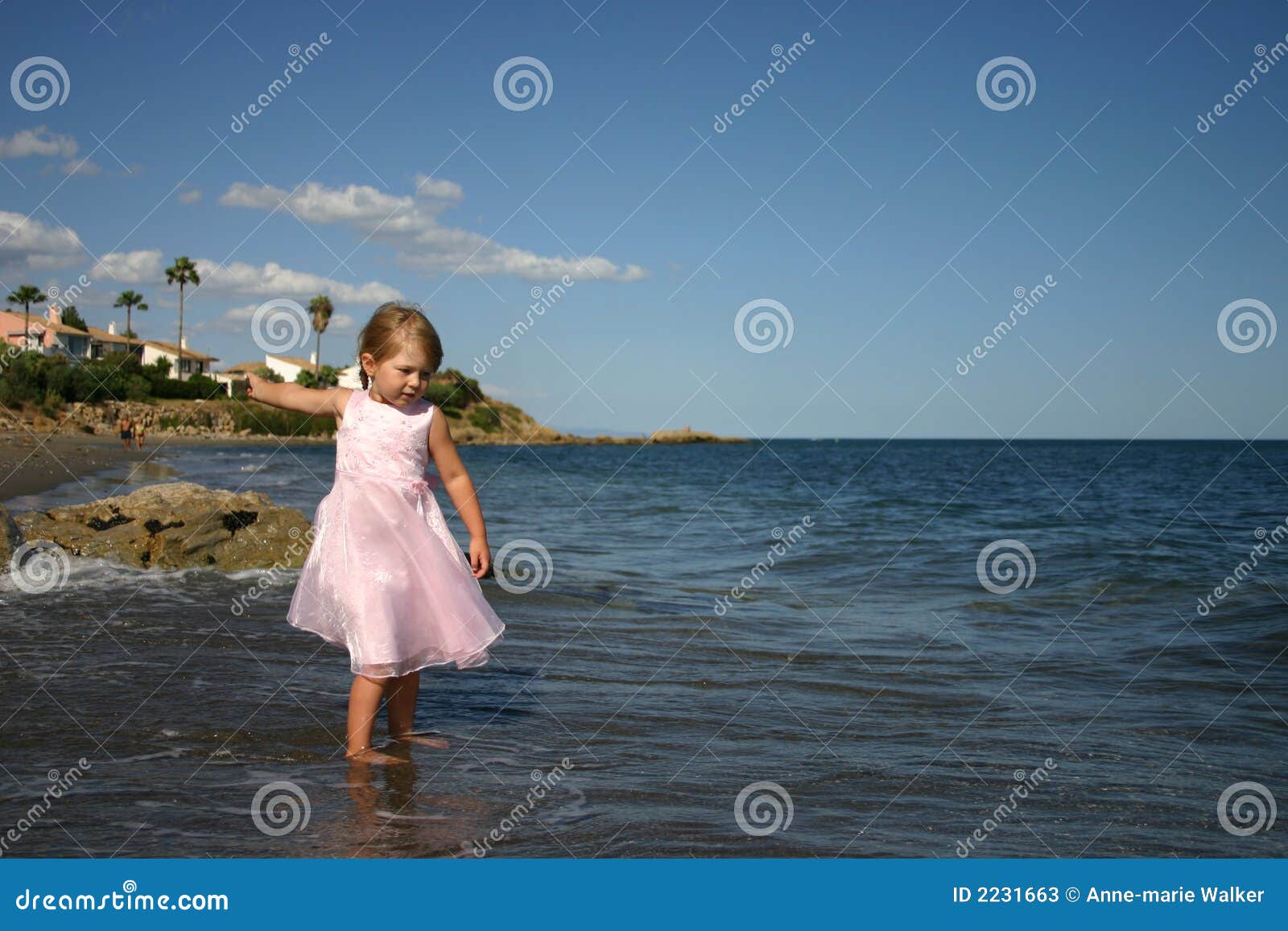 Girl Throwing stones stock image. Image of palm, blue - 2231663