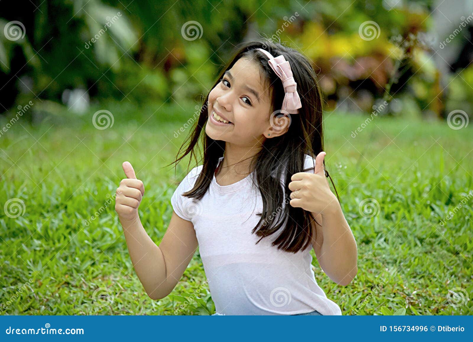 Girl with Thumbs Up stock photo. Image of finger, beautiful - 156734996