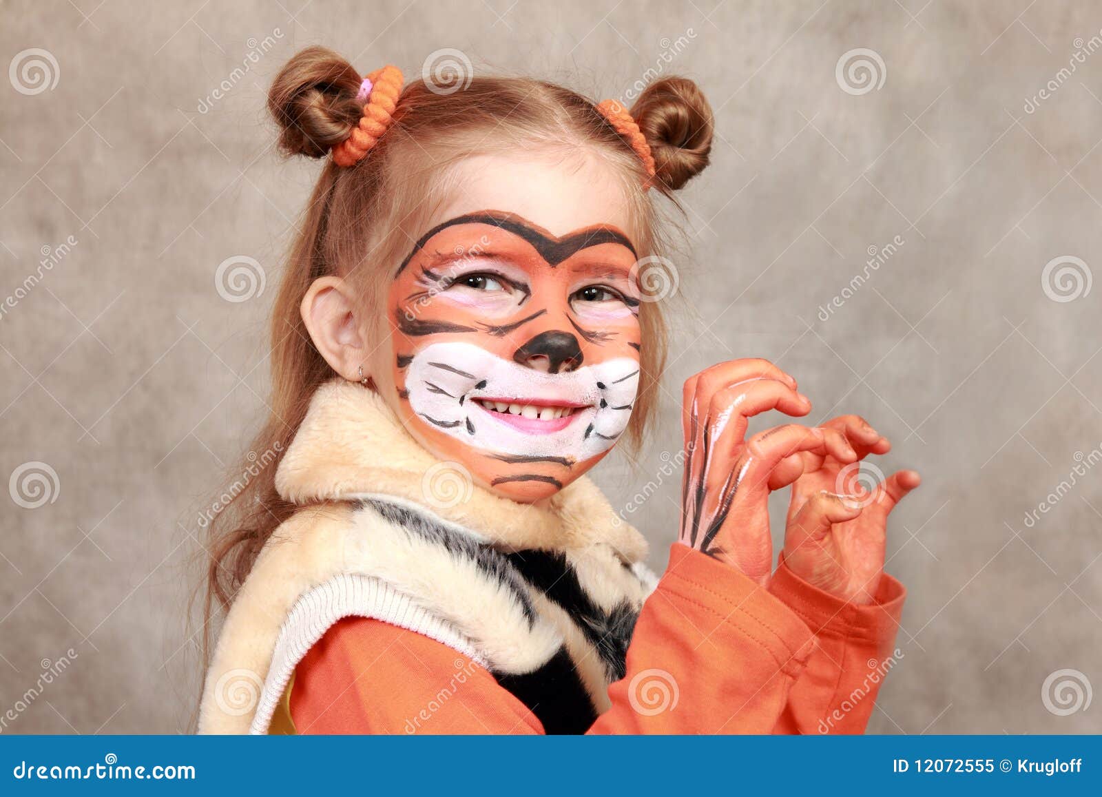 Girl With Tiger Face Painting Stock Photo | CartoonDealer.com #42583884