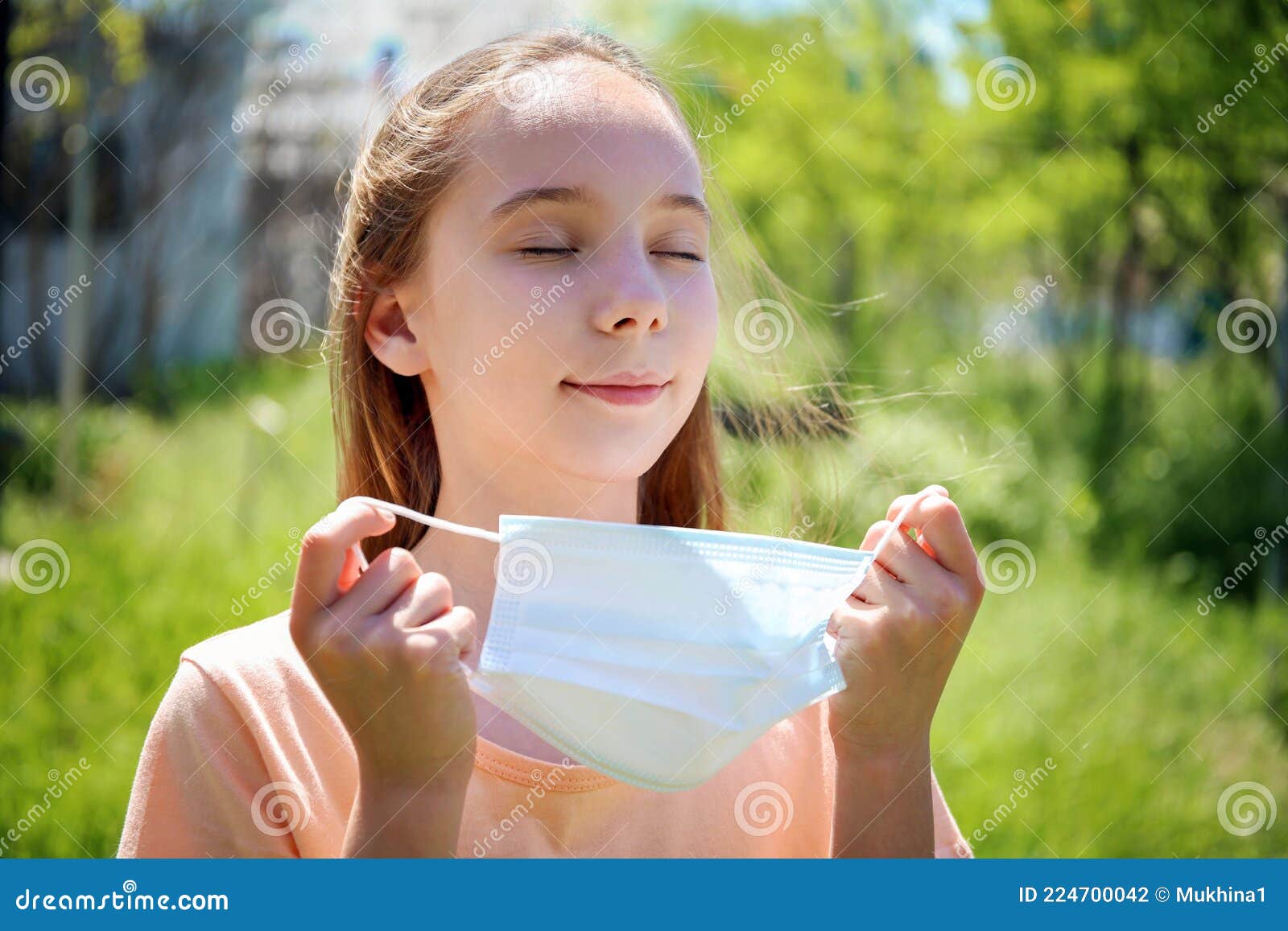 Girl Took Off Her Medical Face Mask Breathes Fresh Air Outside Stock