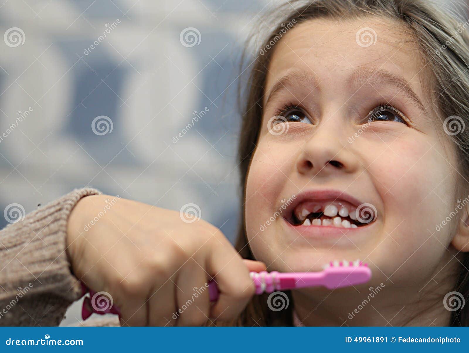 Girl Without A Tooth While Brushing Teeth Royalty-Free Stock ...