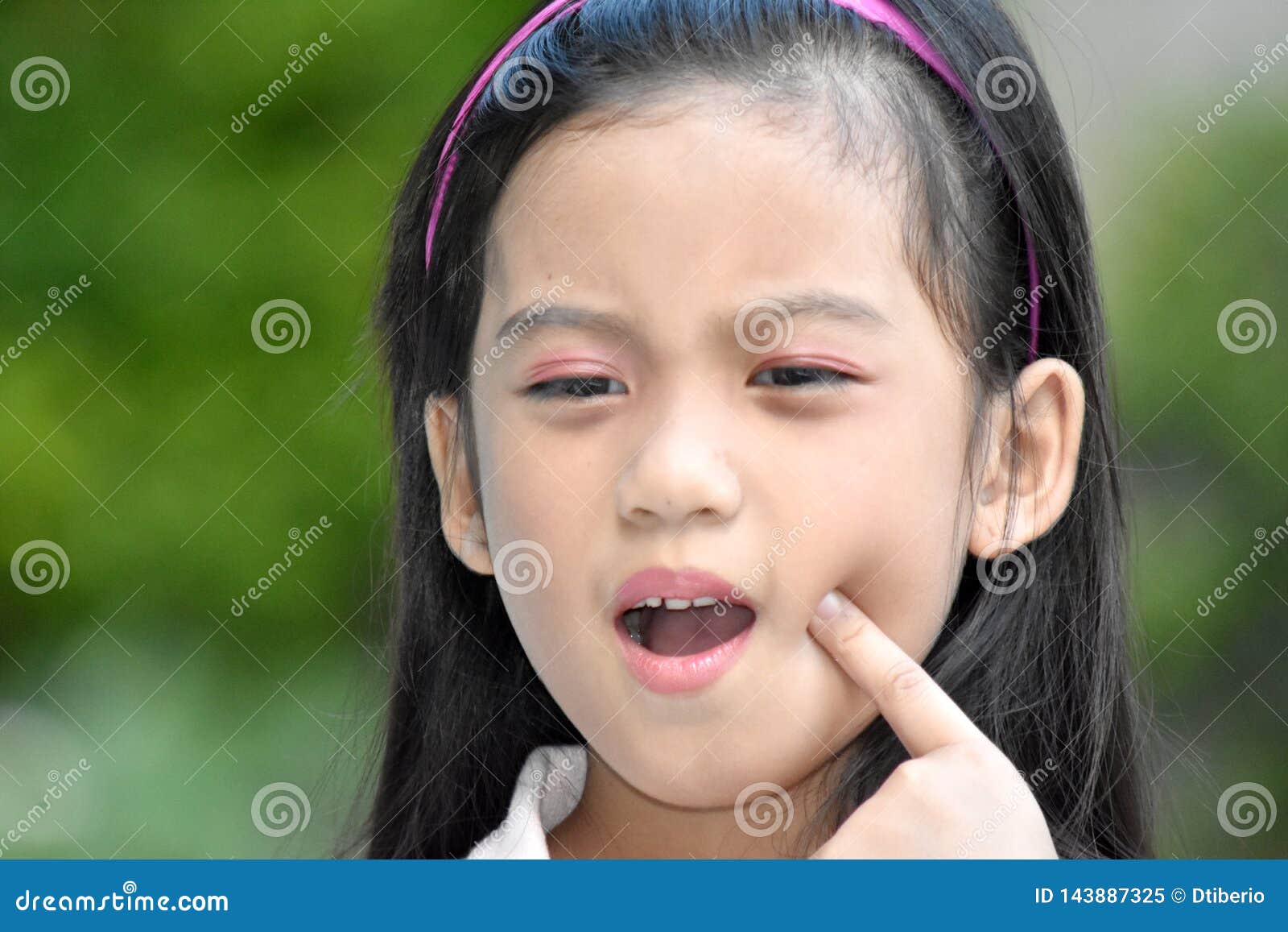 A Girl with Toothache stock image. Image of childhood - 143887325