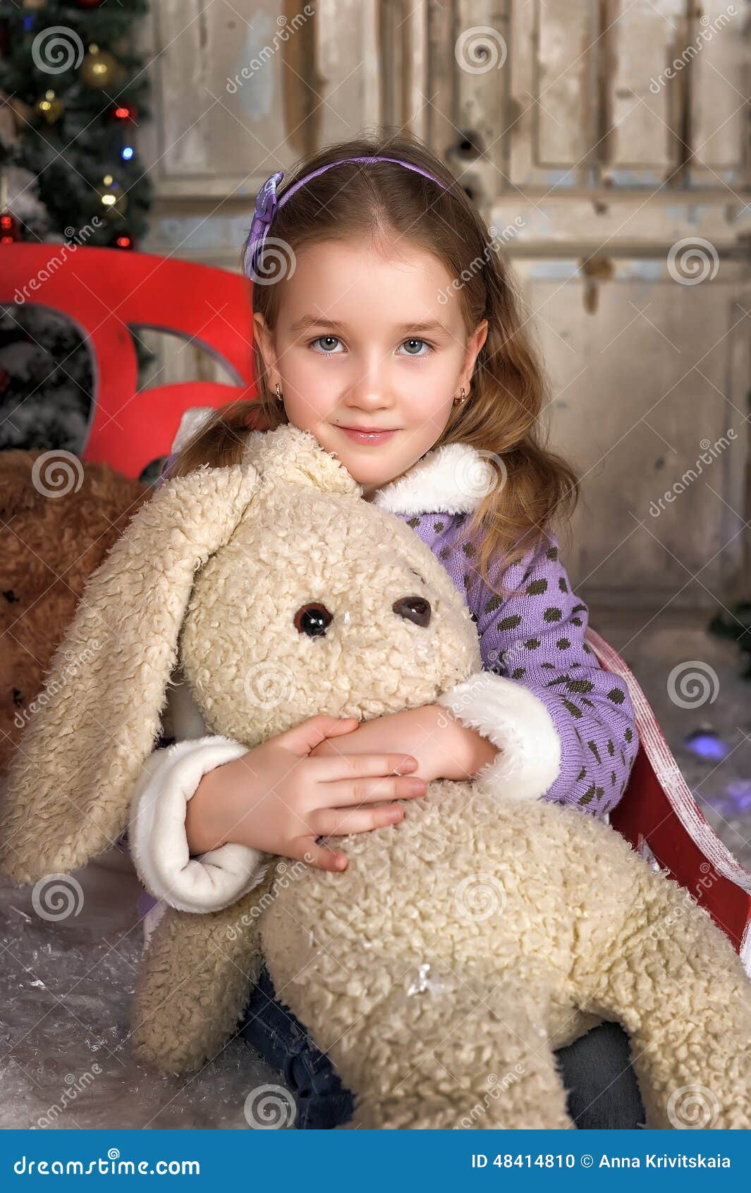 Girl with a Toy Hare in Hands Stock Photo - Image of cheerful, carefree ...