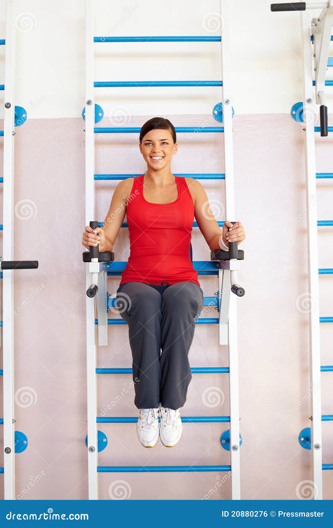 Girl on training machine stock photo. Image of feminine - 20880276