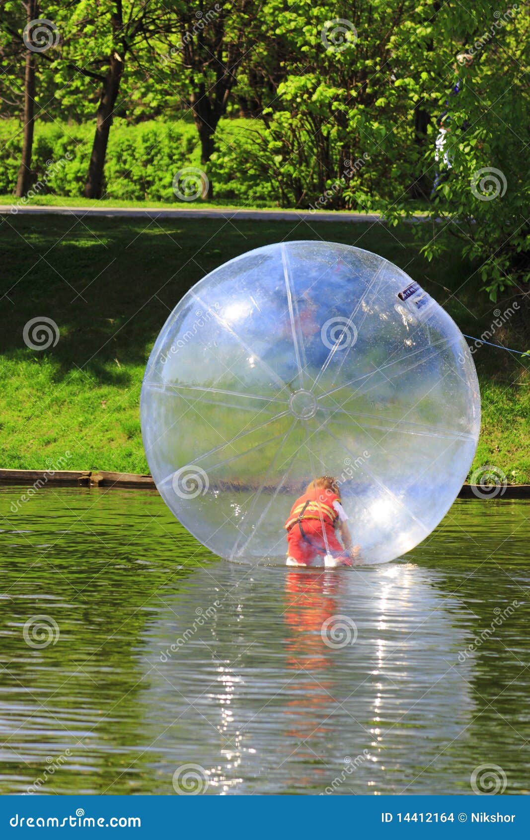 The Girl in a Transparent Sphere Stock Photo - Image of bushes ...