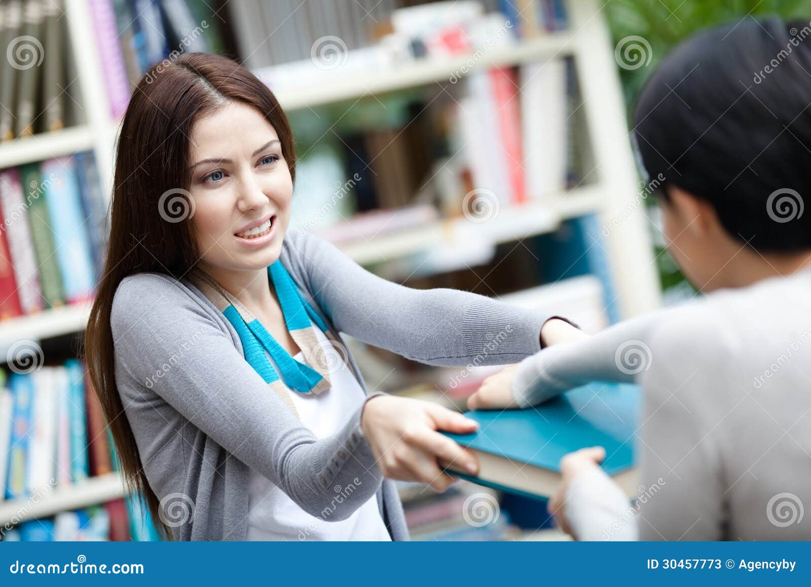 Girl Tries To Take the Book Away Stock Image - Image of information ...