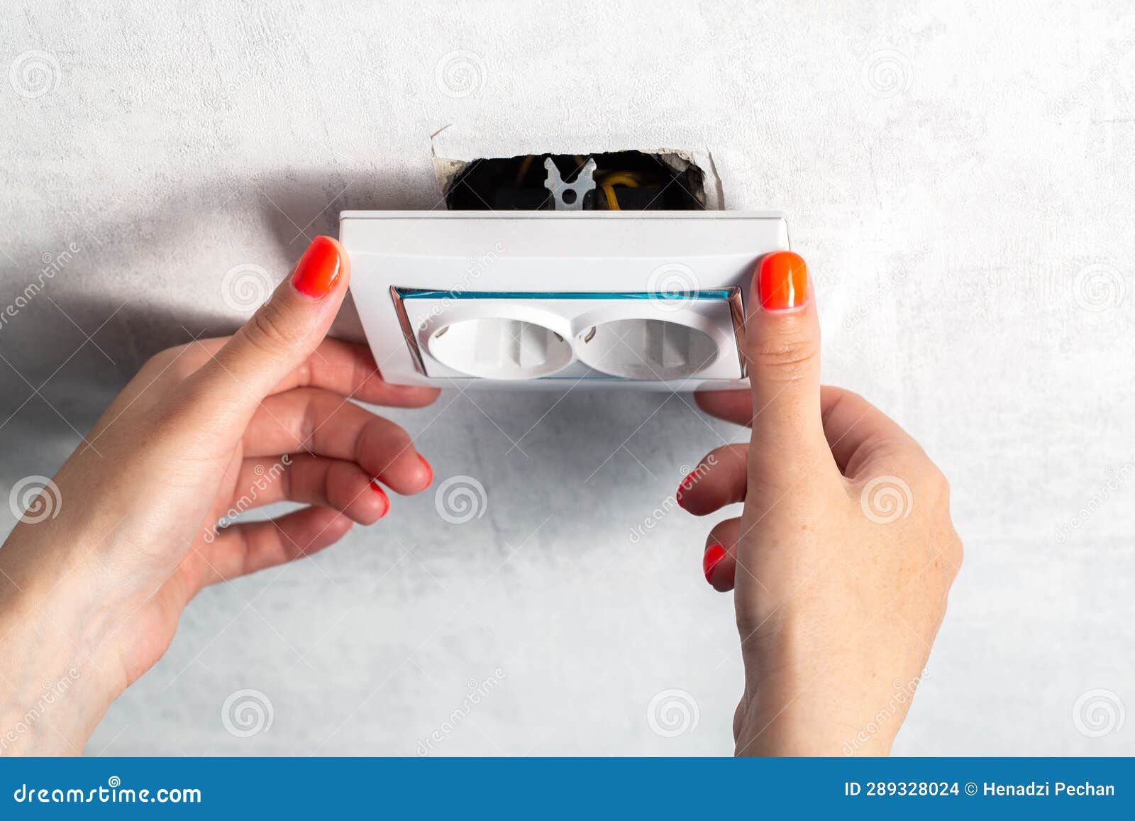 Pulling An Electrical Cable Out Of A Wall Socket To Save Energy Royalty ...