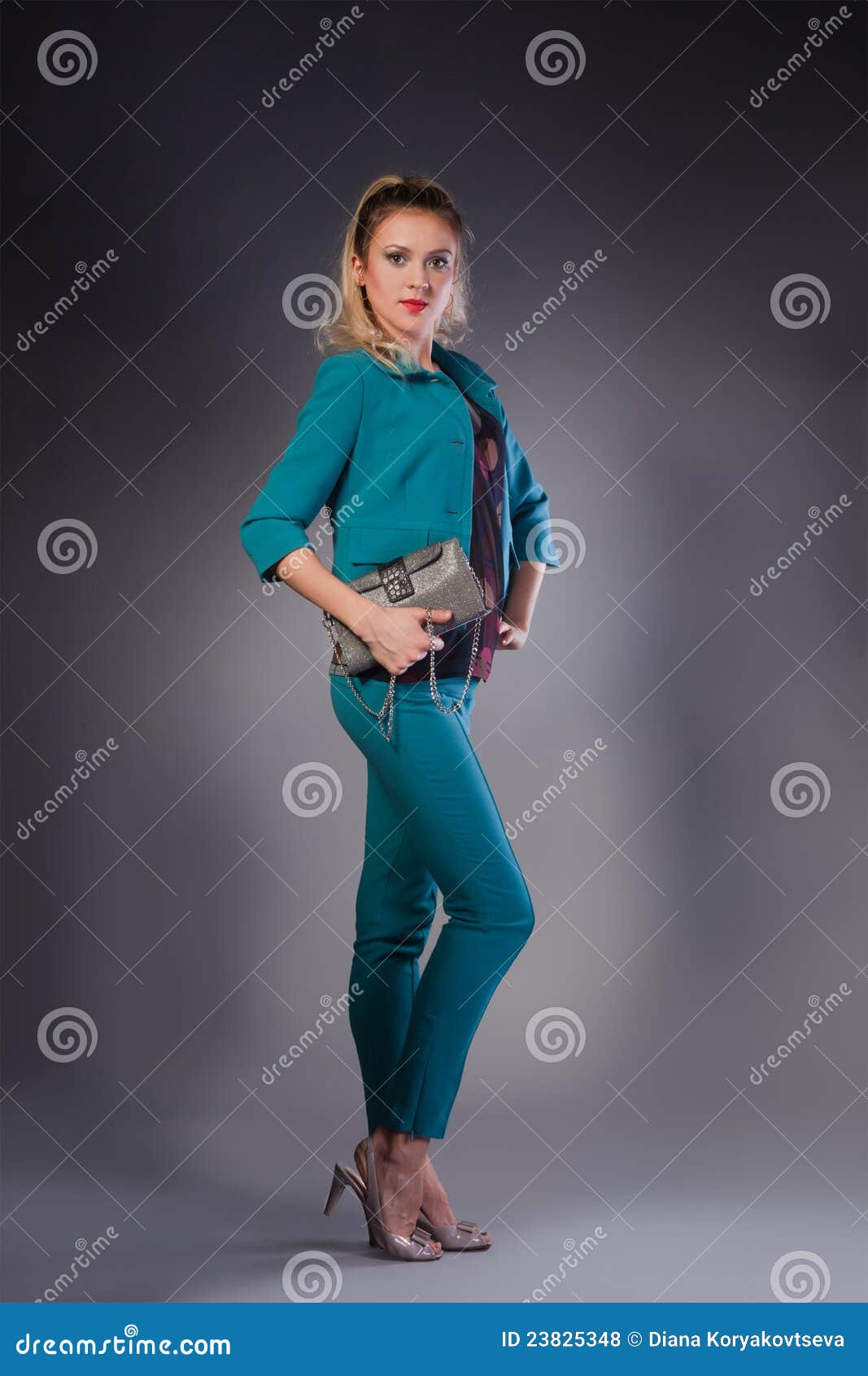 Girl in Turquoise Posing in Studio Stock Photo - Image of jacket ...