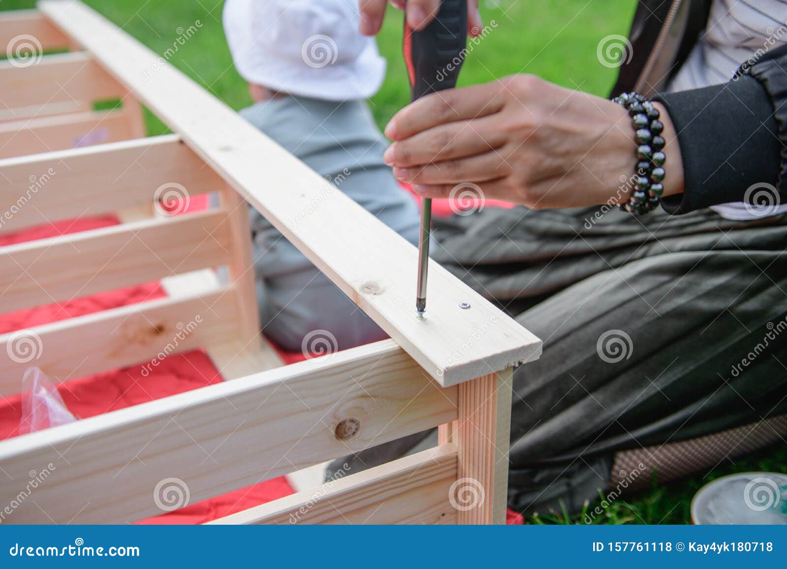Girl Twists a with a Screwdriver. Close-up Stock Photo - Image of ...