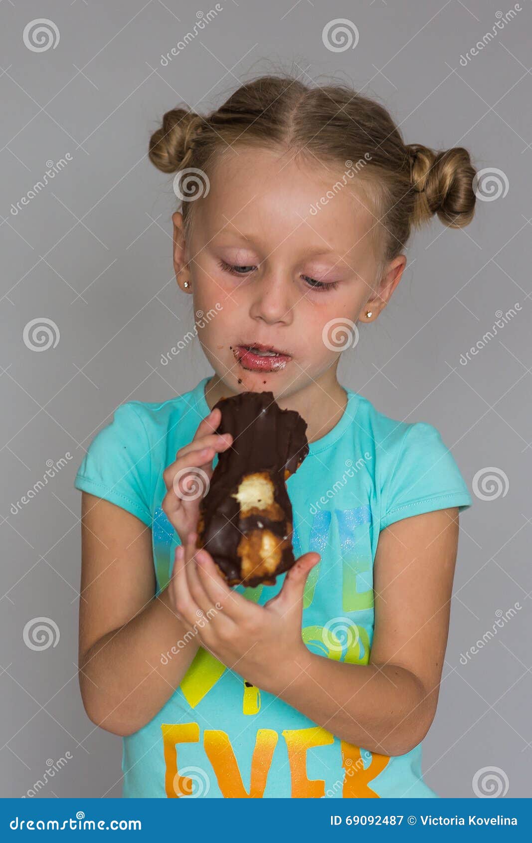 The Girl with Two Plaits Biting a Chocolate Cake Stock Image - Image of ...