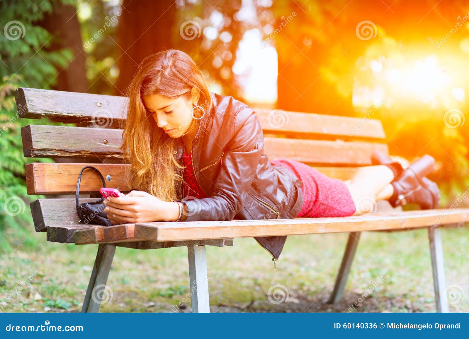 Girl typing on her phone stock photo. Image of talk, smartphone - 60140336