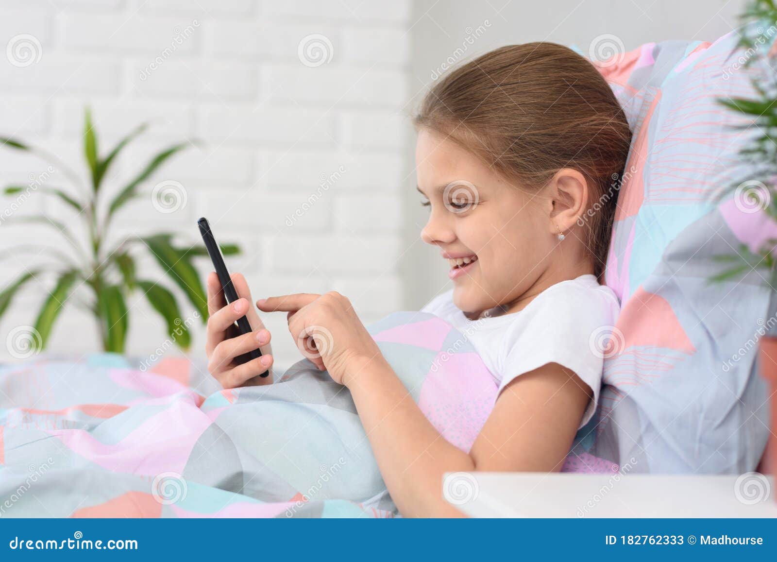 Girl is Typing a Message in a Mobile Phone Stock Image - Image of ...