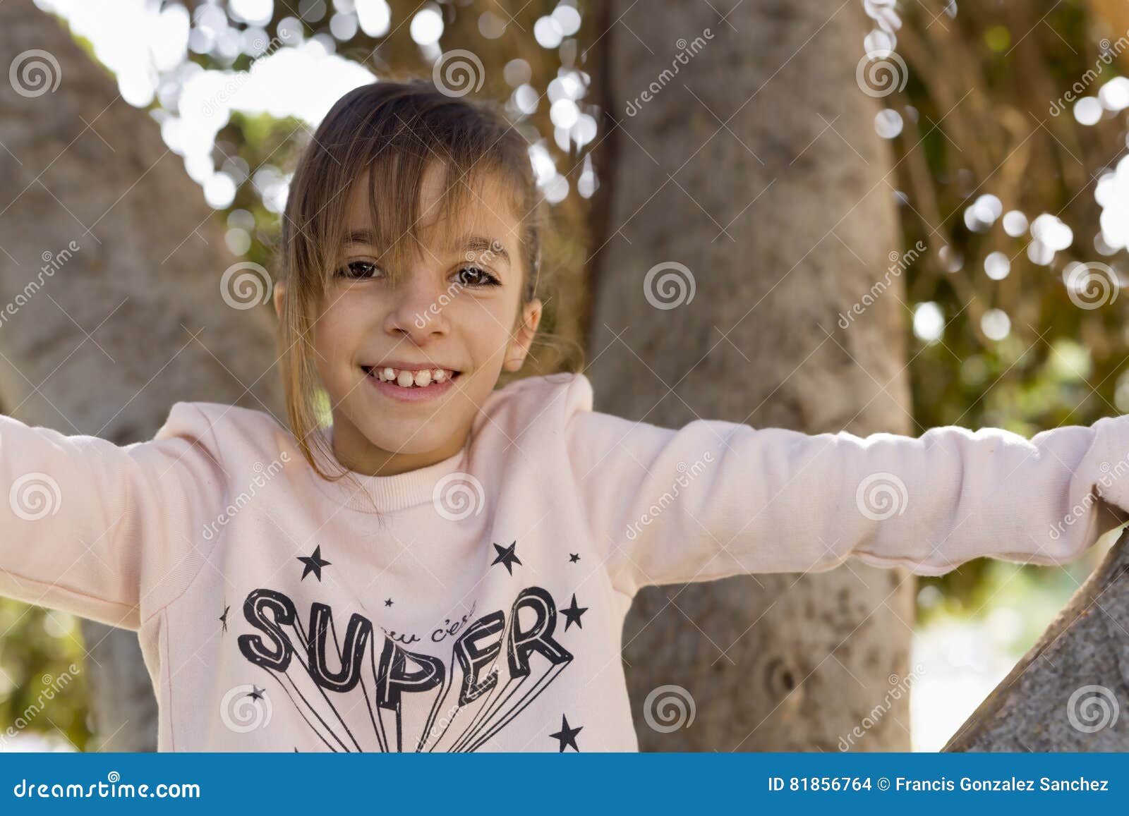 Girl up in a tree. stock photo. Image of game, people - 81856764