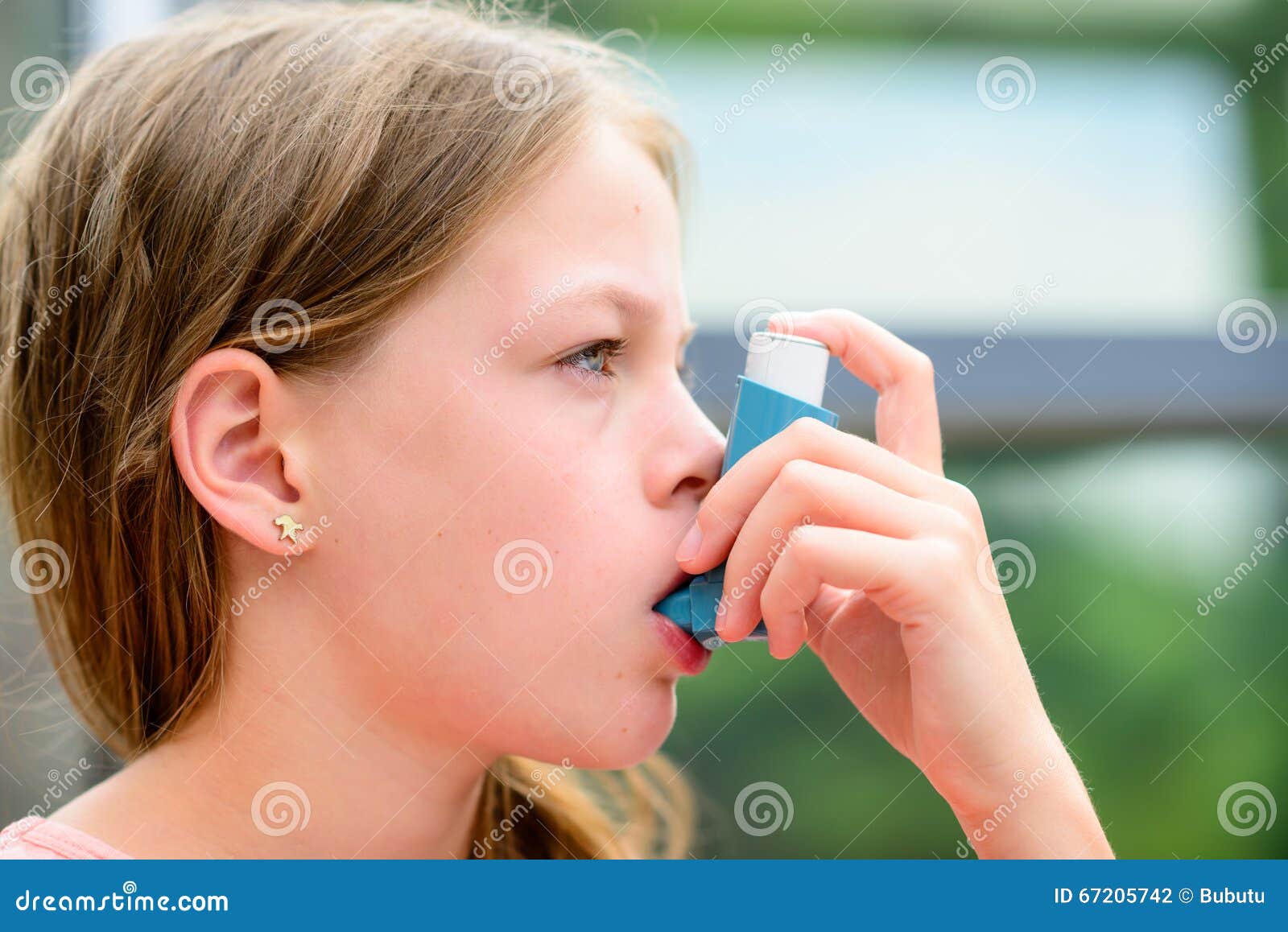 Girl Uses an Inhaler during an Asthma Attack Stock Photo - Image of ...