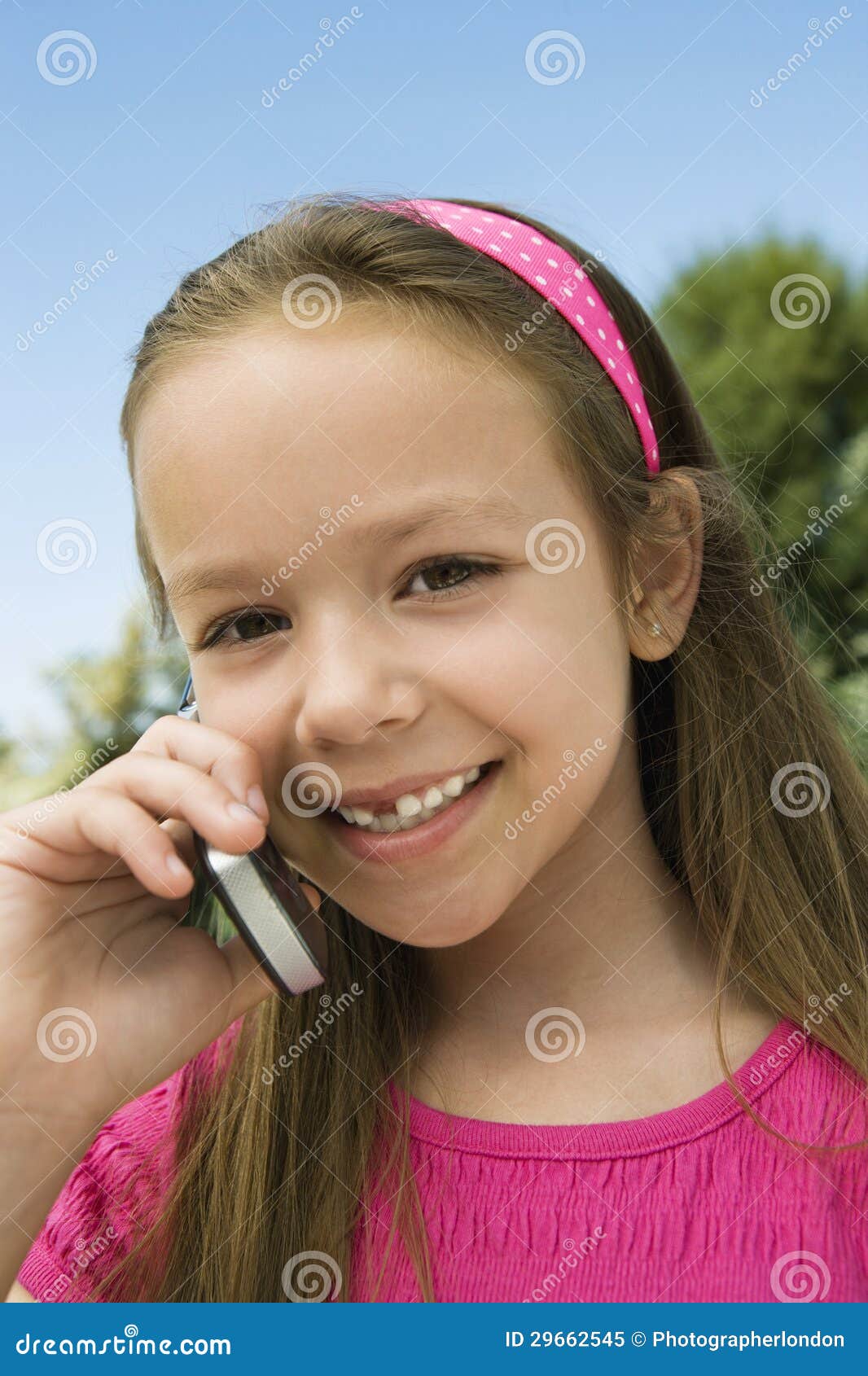 Girl Using Cell Phone stock image. Image of female, happy - 29662545