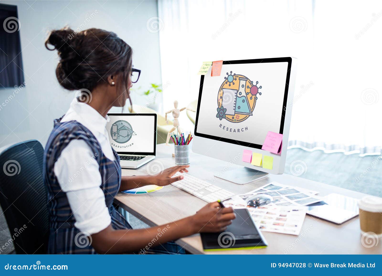 Girl Using Computers with Education Icons on the Screen Stock Photo ...