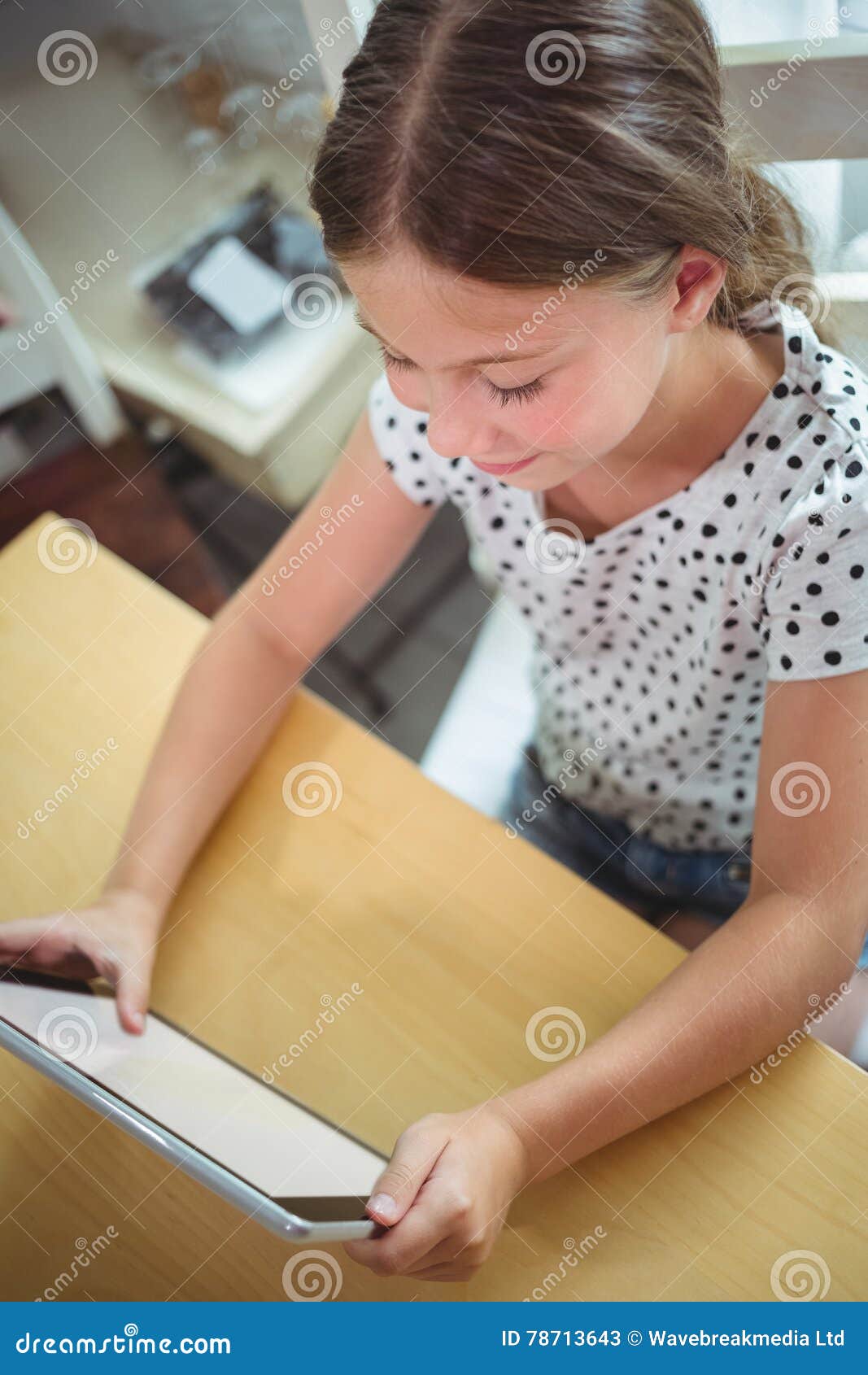 Girl using digital tablet stock image. Image of living - 78713643