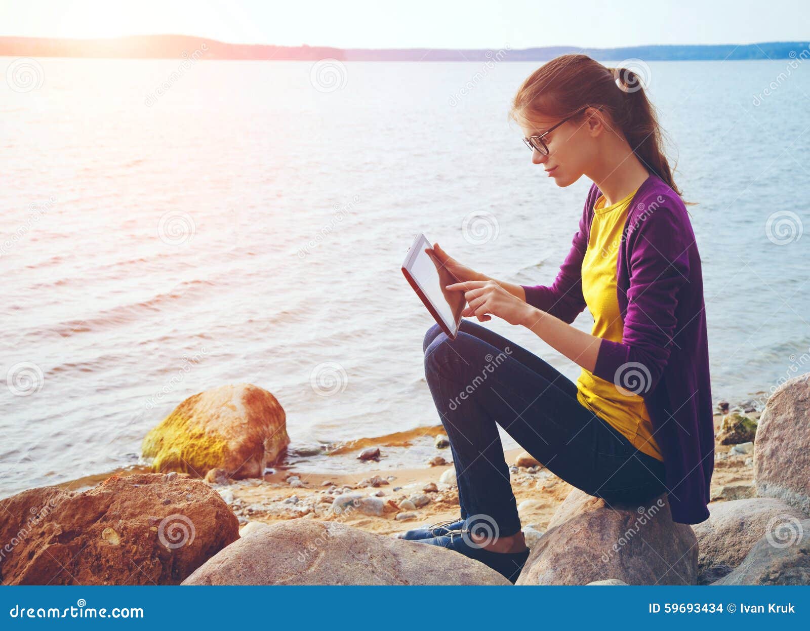 Girl Using Digital Tablet at Sea Stock Photo - Image of connection ...