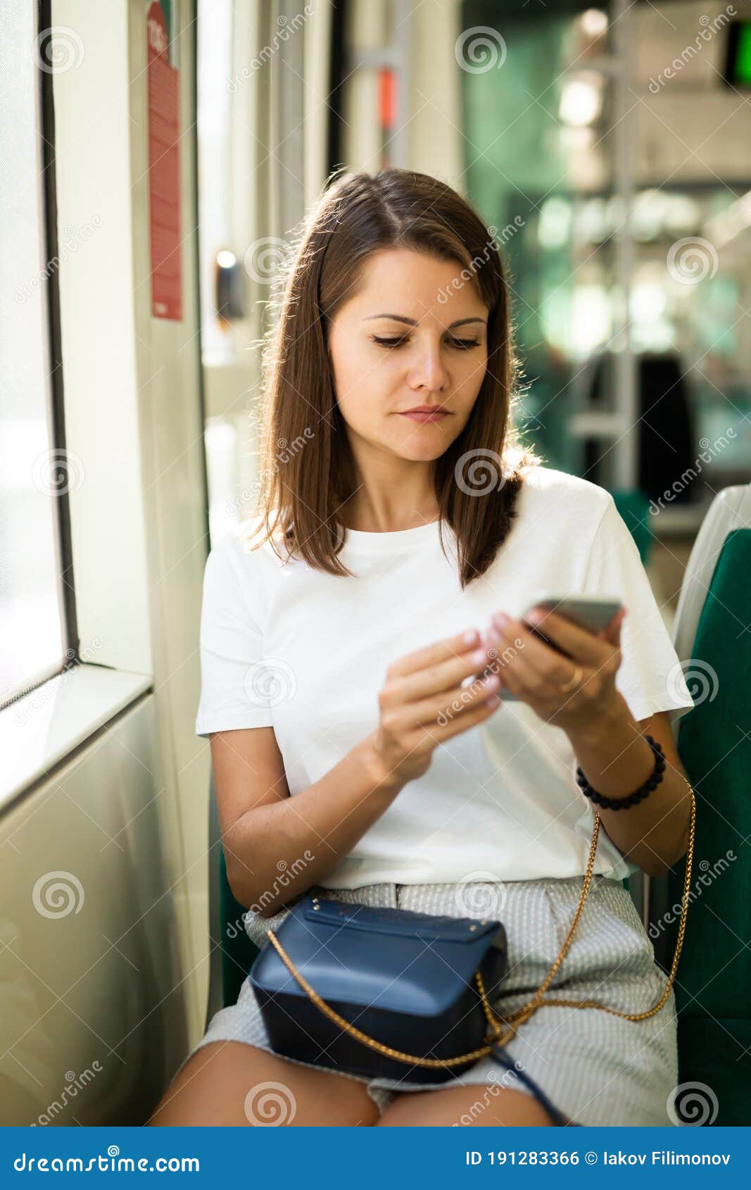 Girl Using Smartphone in Public Transport Stock Photo - Image of ...