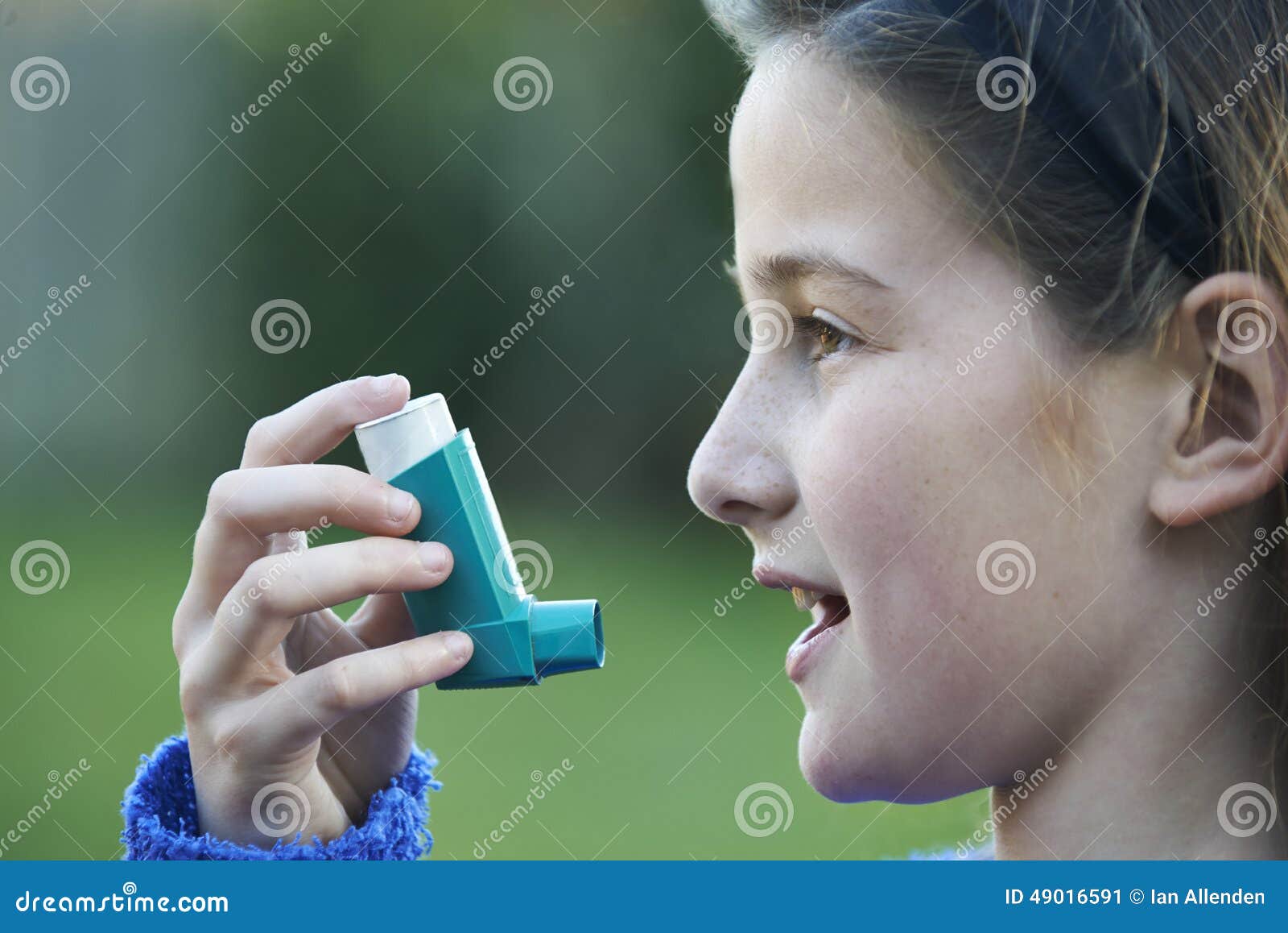 Girl Using Inhaler To Treat Asthma Attack Stock Image - Image of ...