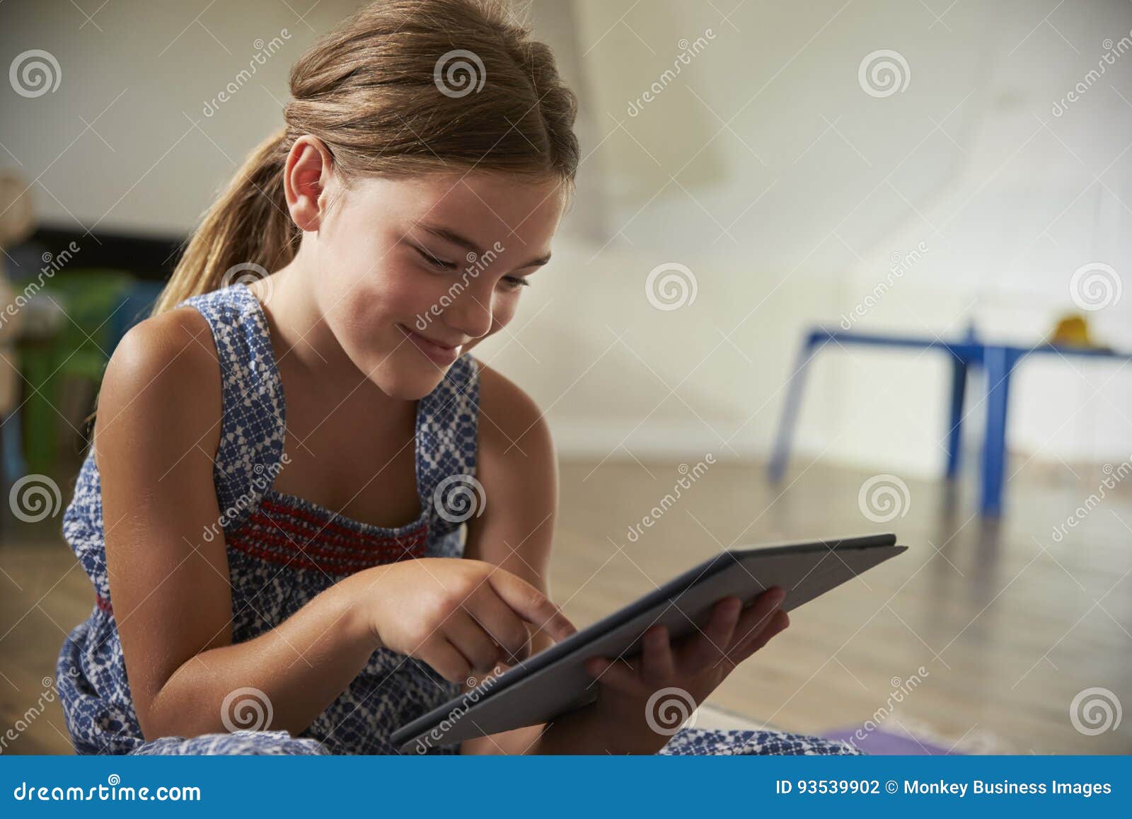 Girl Using Laptop Computer in Playroom Stock Photo - Image of internet ...