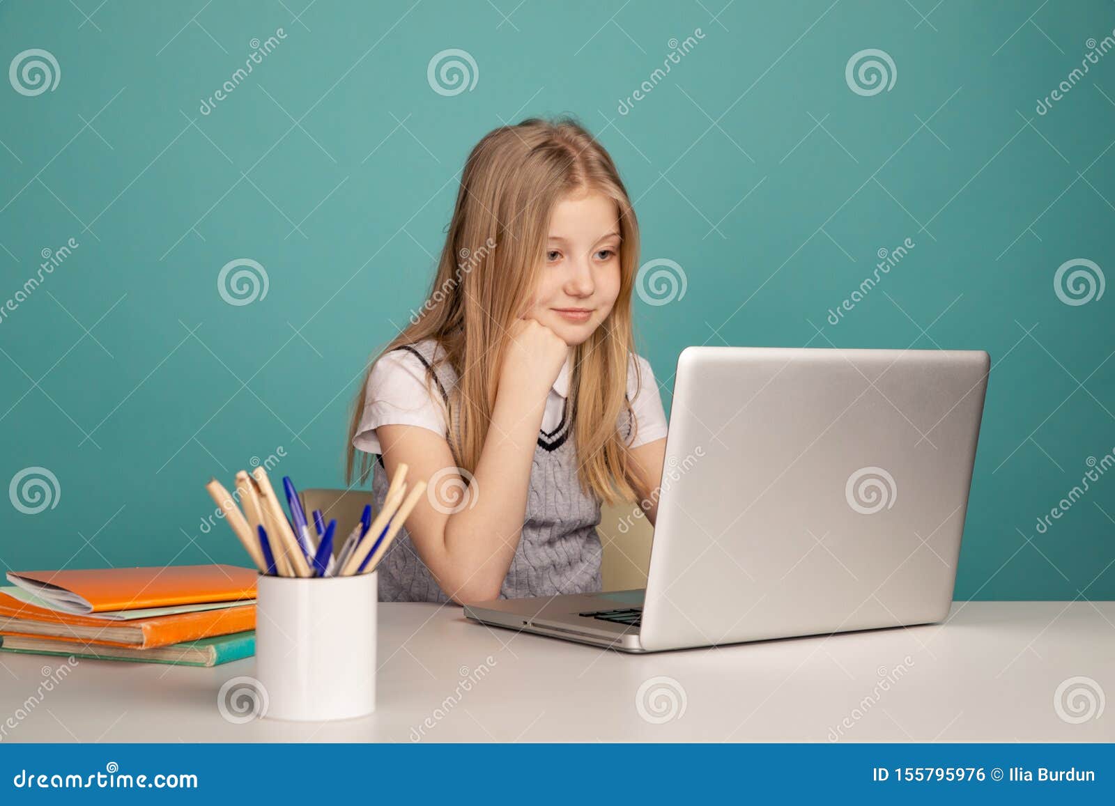 Girl Using a Laptop Computer at Stock Photo - Image of little ...
