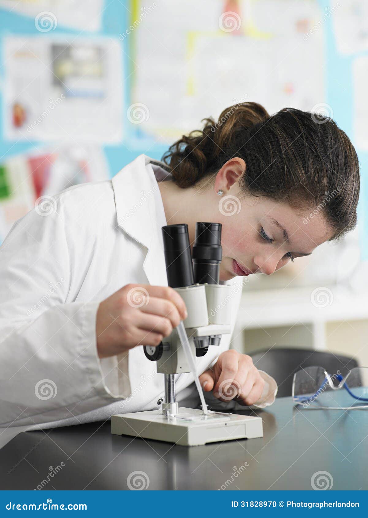 Girl Using Microscope in Laboratory Stock Photo - Image of lifestyle ...