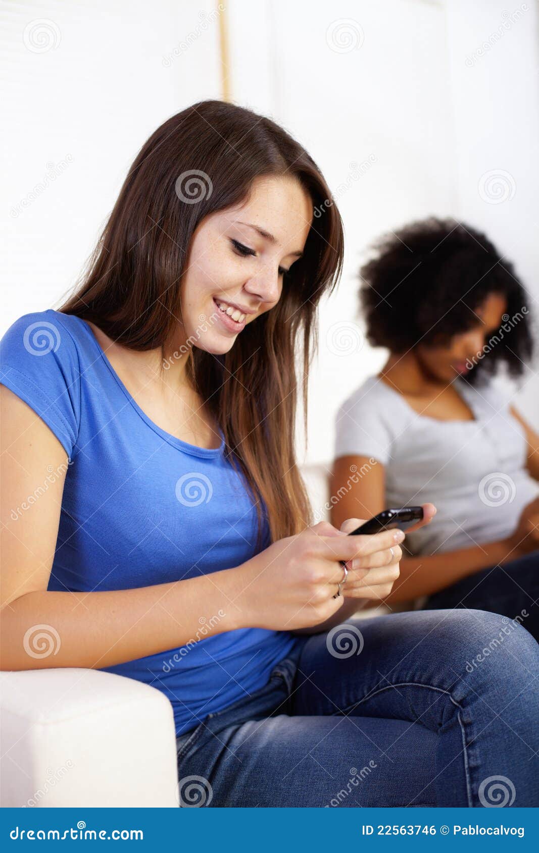 Girl using a mobile phone stock photo. Image of caucasian - 22563746