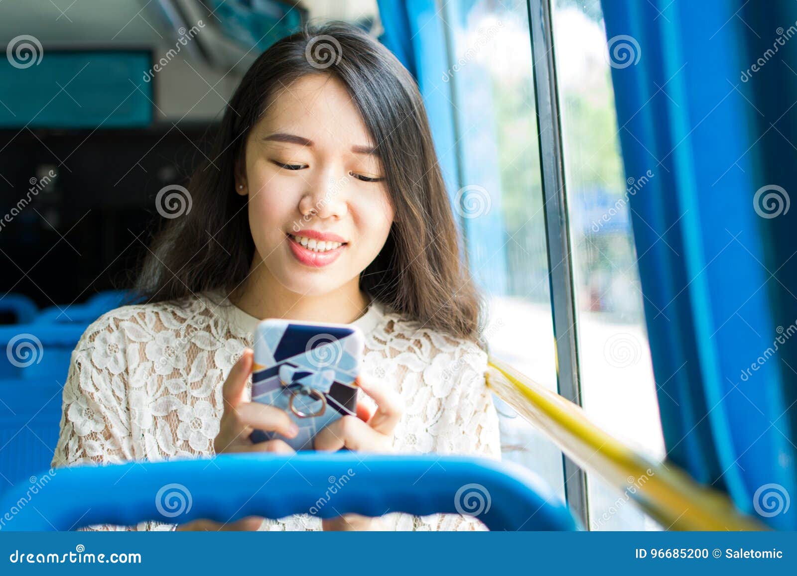 Girl Using Phone on Public Bus Stock Photo - Image of chat, inside ...