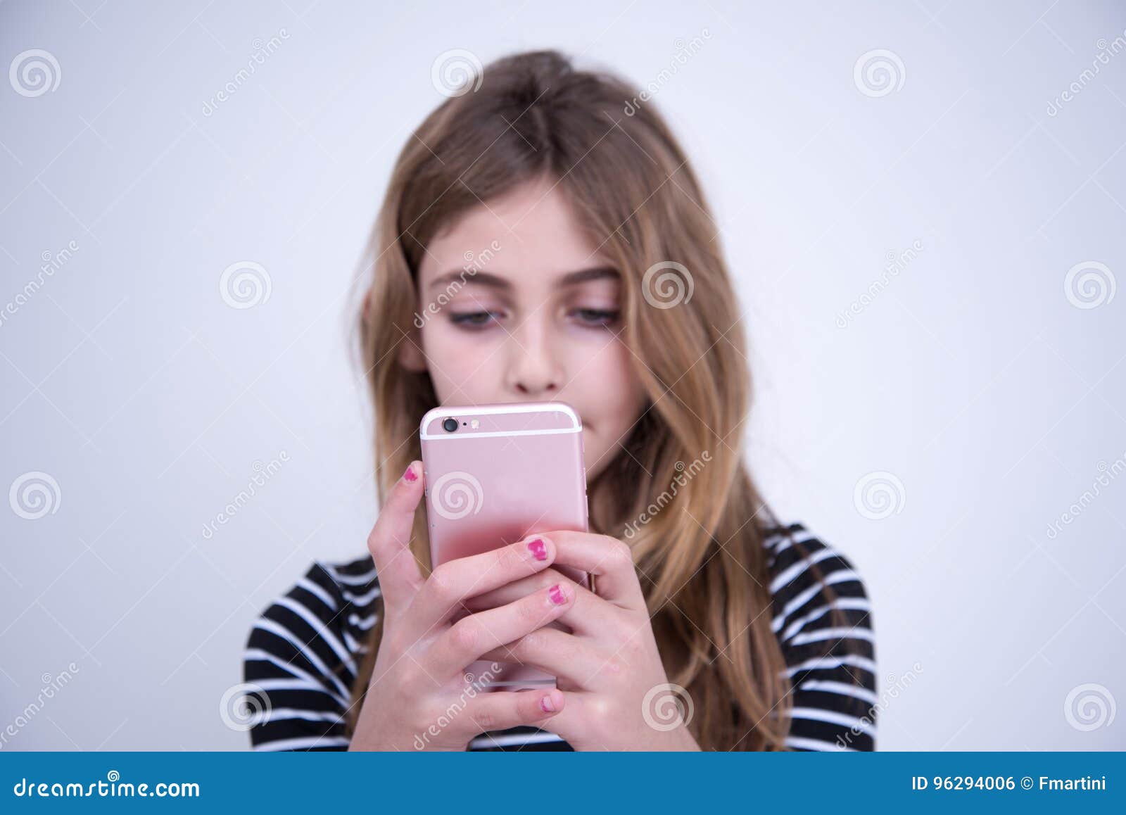 Girl Using Pink Phone in Serius Moment Stock Photo - Image of blond ...