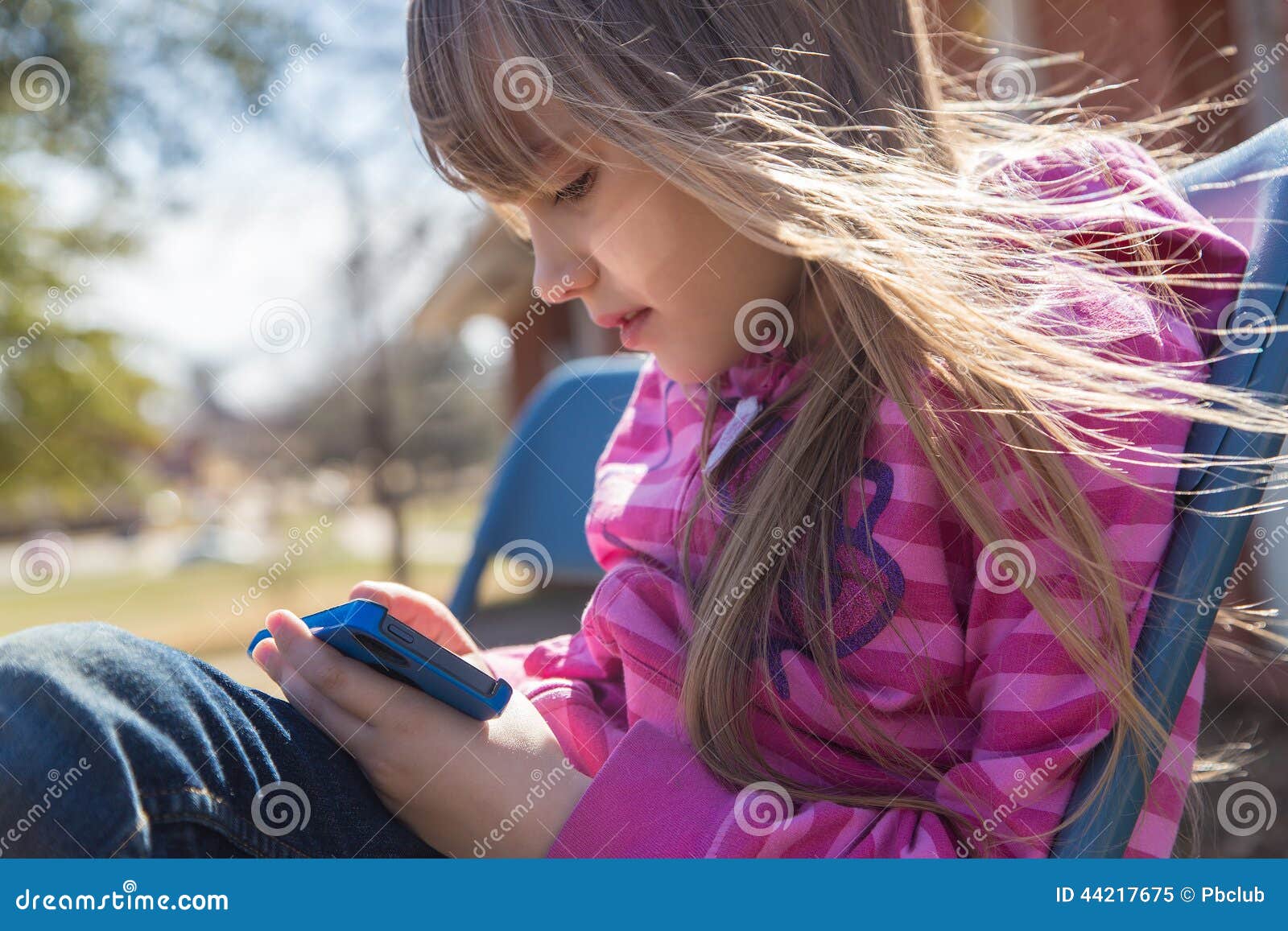 Girl using smartphone stock image. Image of screen, smart - 44217675