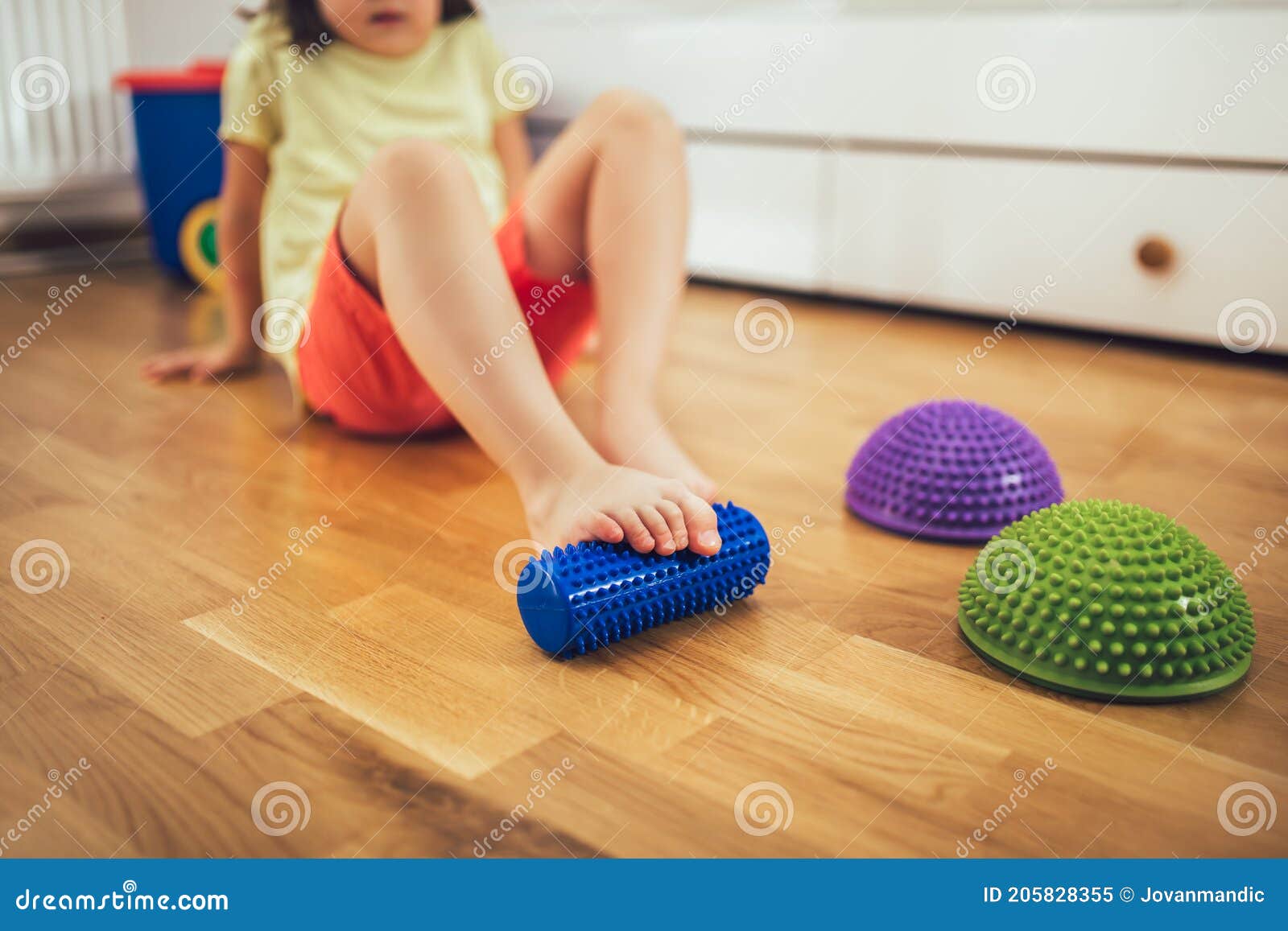 Girl Using Spiked Rubber Roller Stock Image - Image of flexibility ...