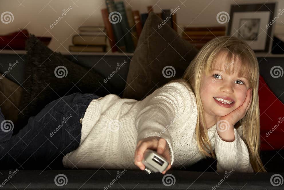 Girl Using Television Remote Control Stock Image - Image of domestic ...