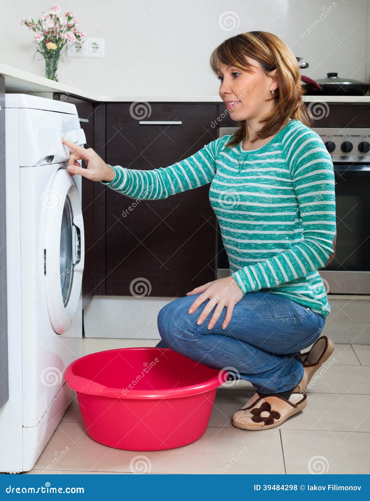 Girl using washing machine stock photo. Image of purity - 39484298