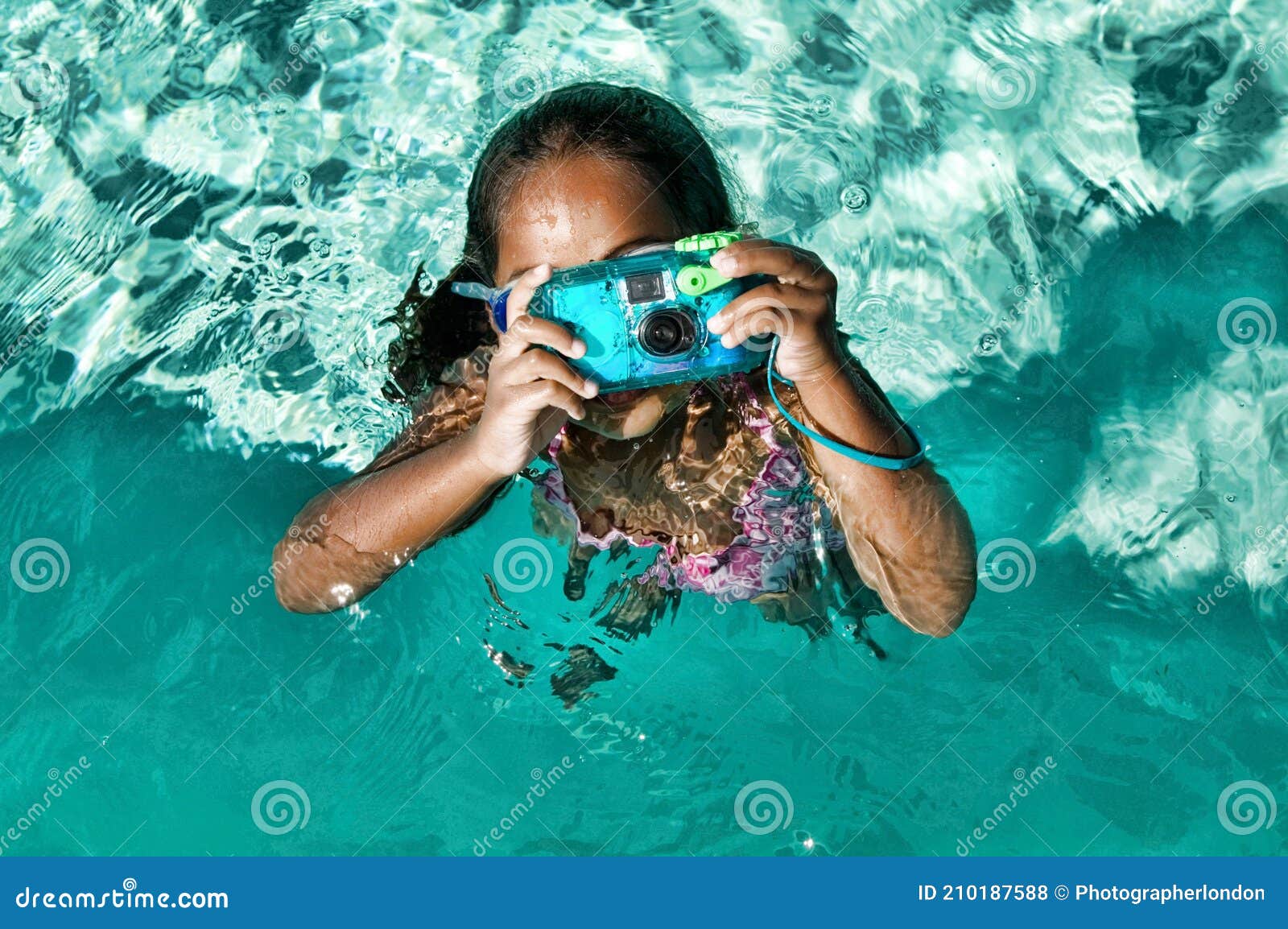 Girl Using Waterproof Camera in Swimming Pool Stock Photo - Image of ...