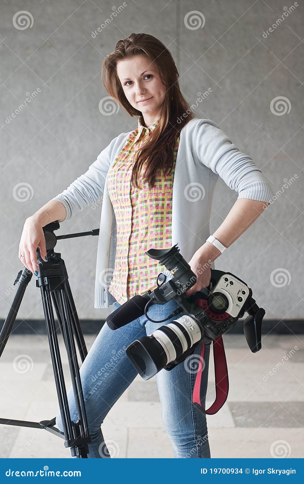 Girl with a videocamera stock photo. Image of person - 19700934