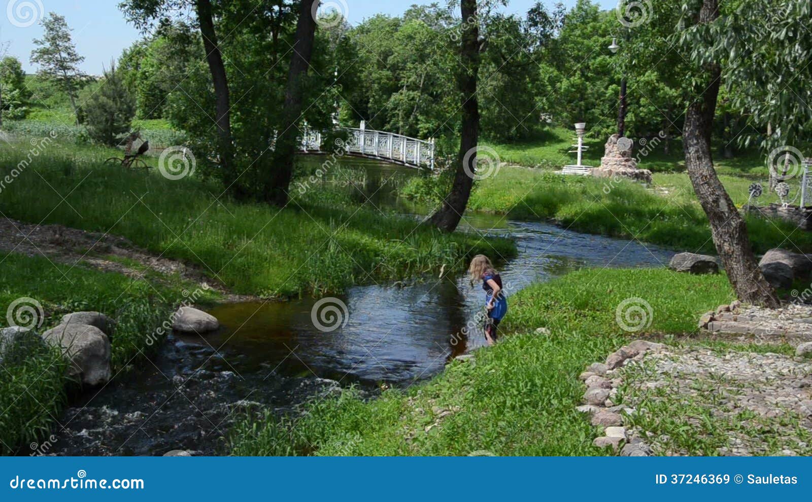 Girl wade through stream stock video. Video of lond, light - 37246369