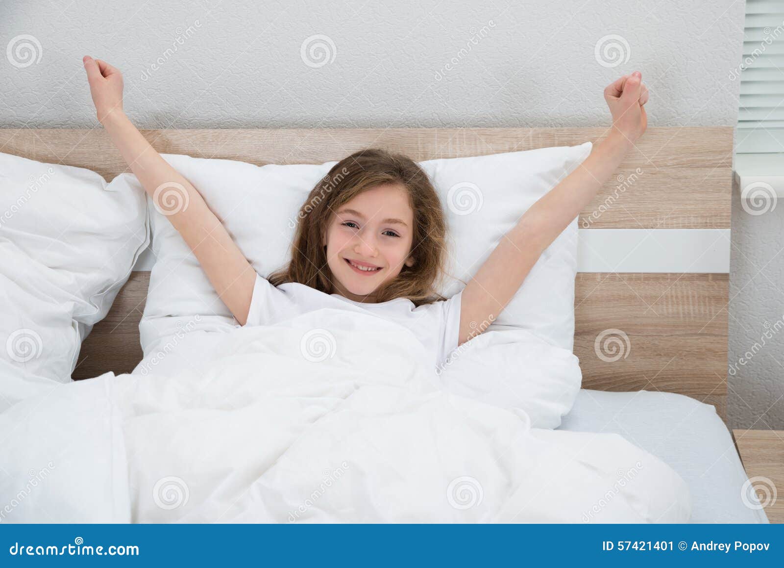 Girl Waking Up From Bed Stock Photo - Image: 57421401