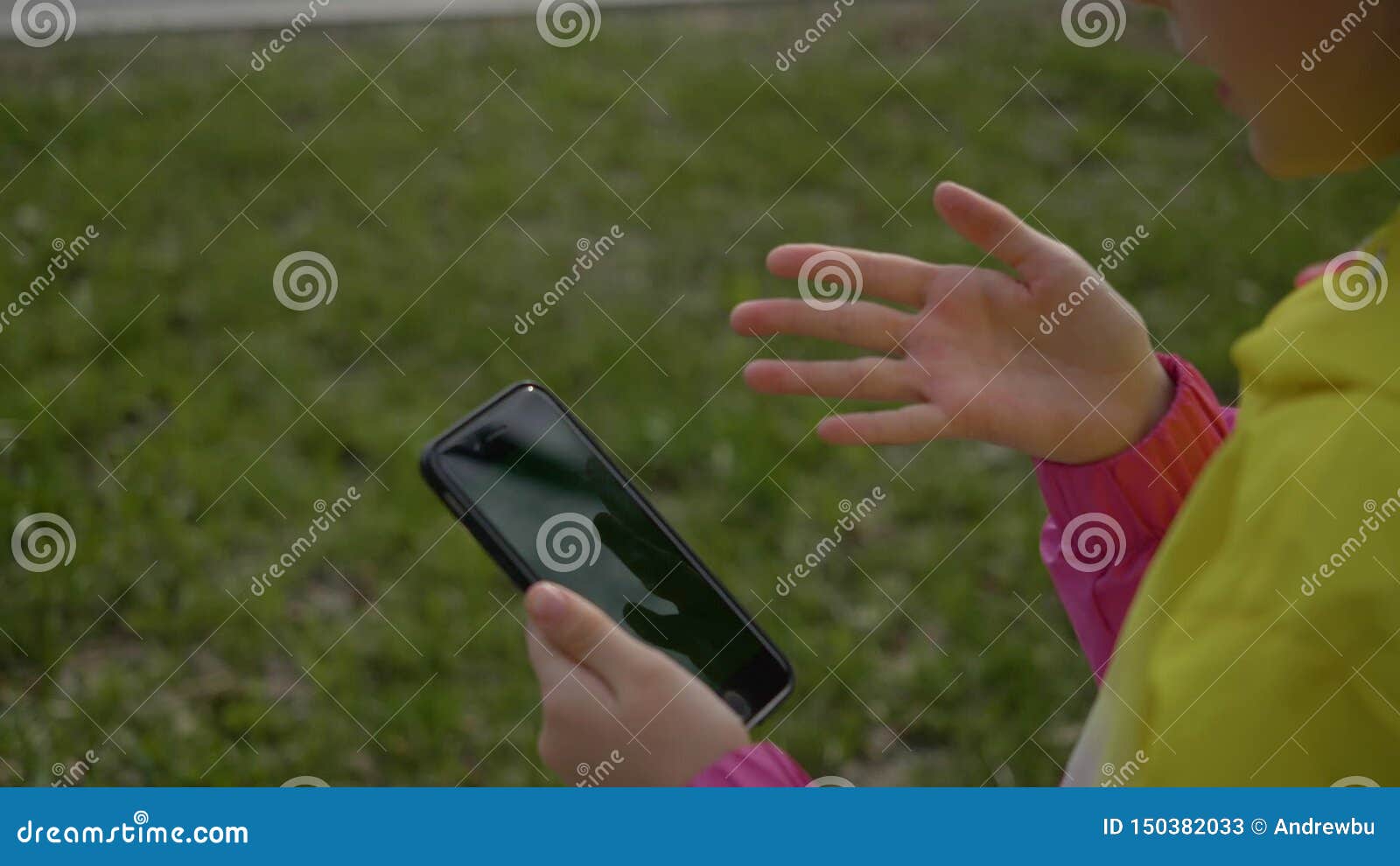 Girl Is Walking Down The Street And Talking With Camera Holding Smartphone In Hands Stock Video