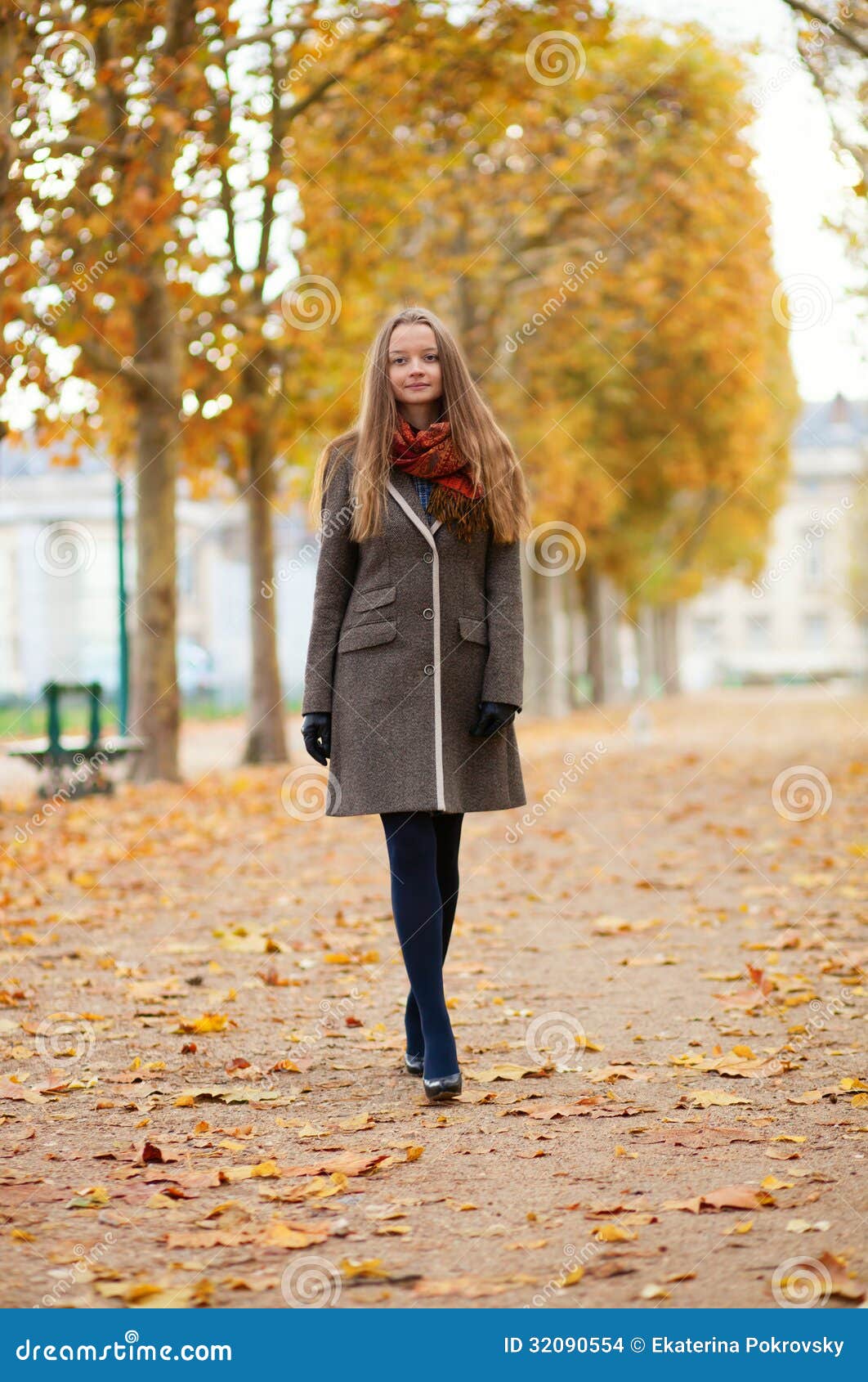 Girl walking on a fall day stock photo. Image of famous - 32090554