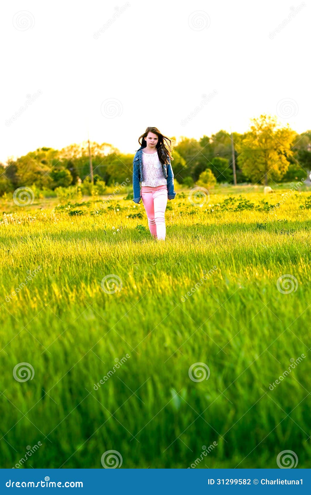 Girl walking in a field stock photo. Image of human, ride - 31299582