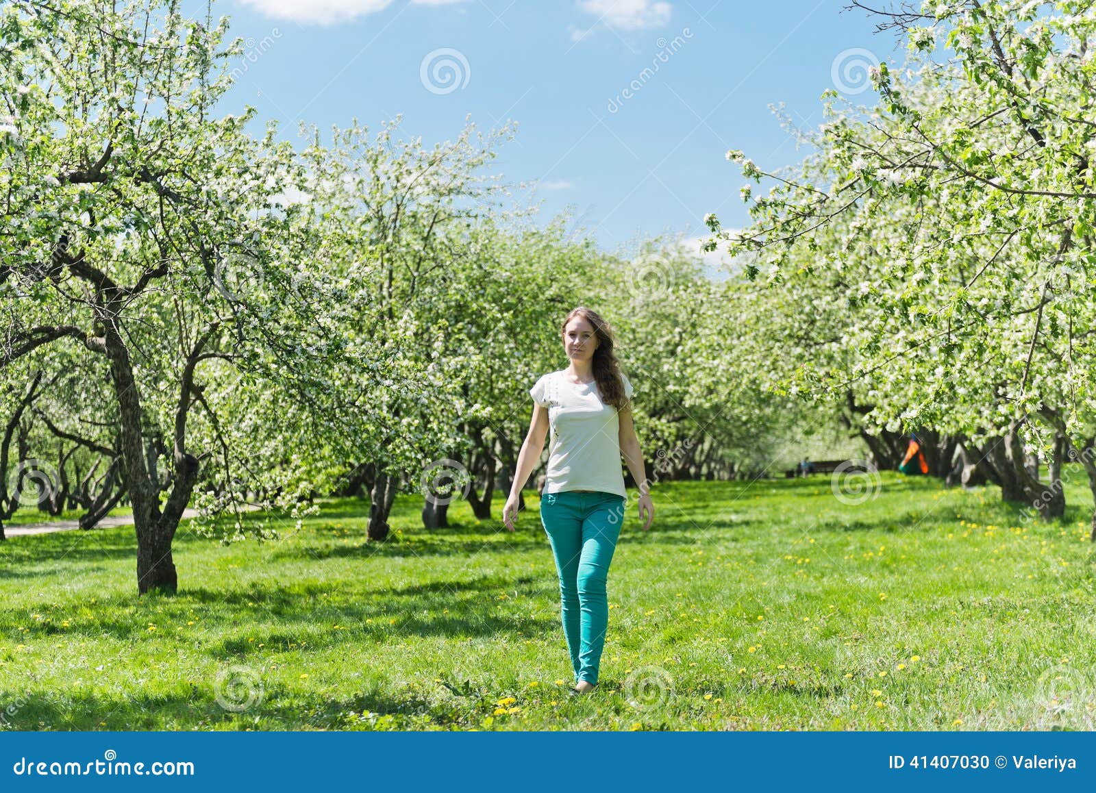 Girl walking in the park. stock photo. Image of alley - 41407030