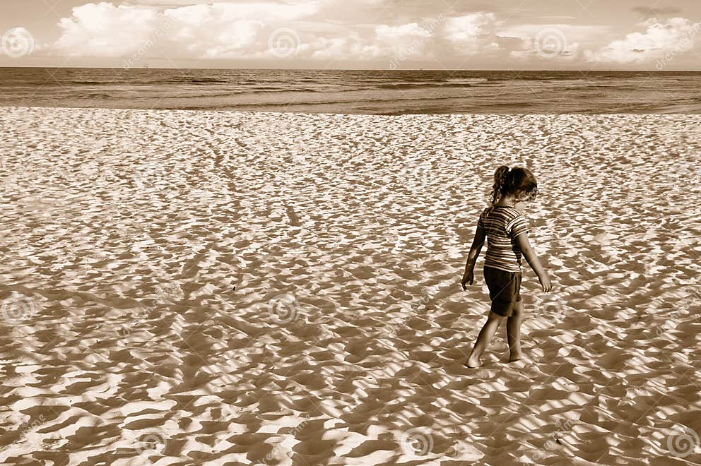 Girl Walking on Sand stock photo. Image of exploring, beauty - 2960730