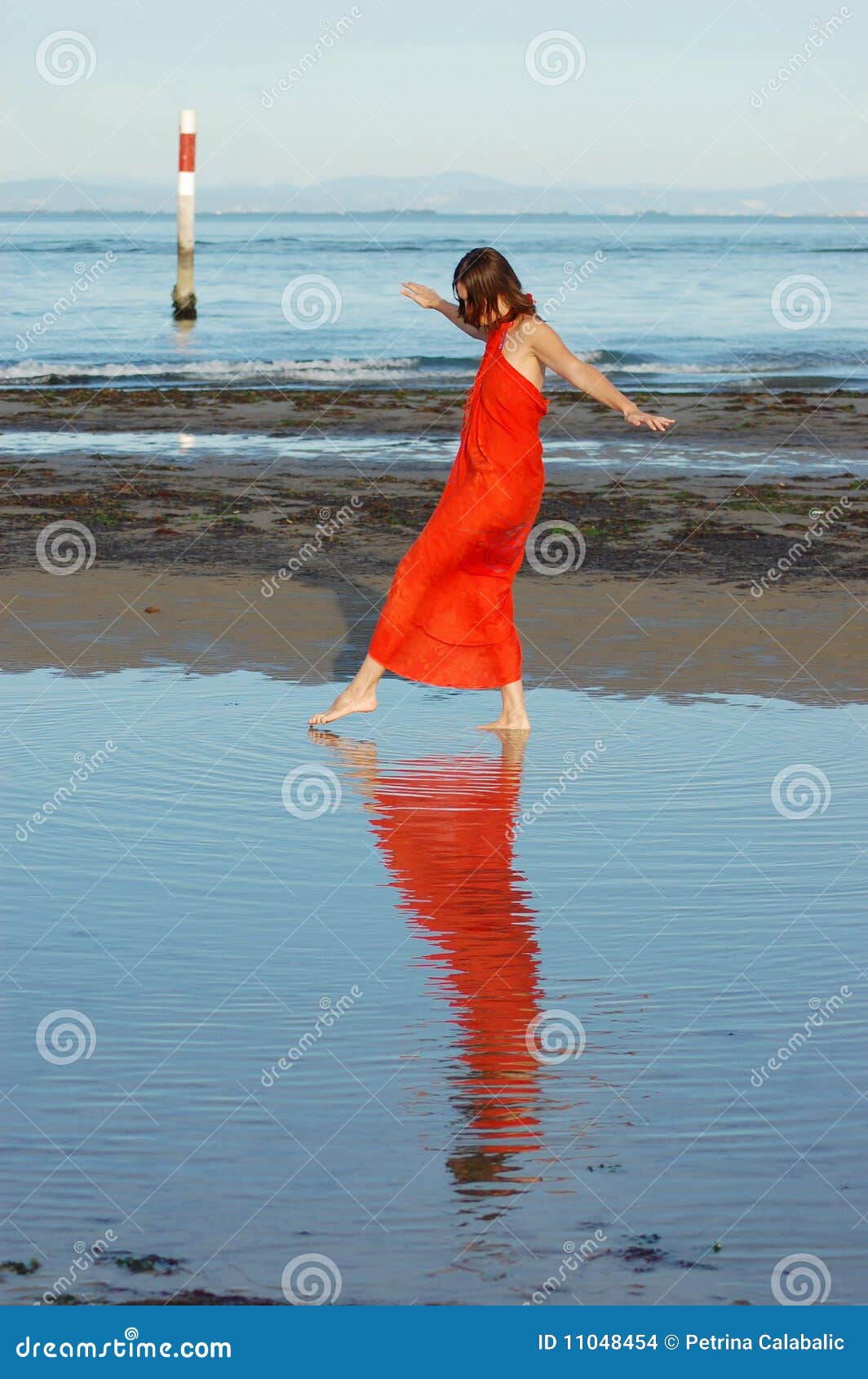 Girl Walking in Shallow Water Stock Photo - Image of lagoon, dance ...